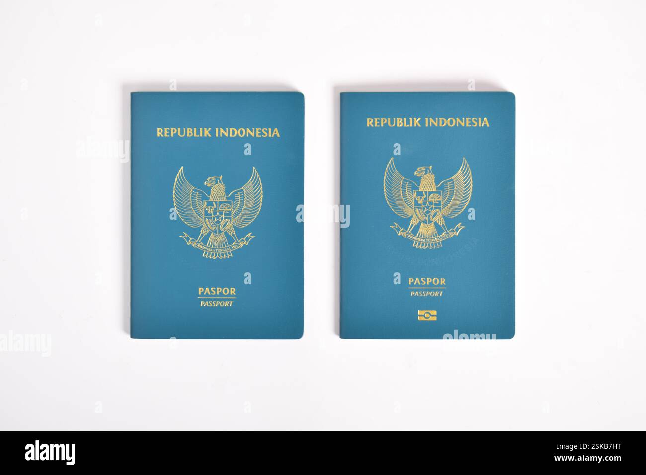 Indonesian electronic passport and regular passport isolated on white ...