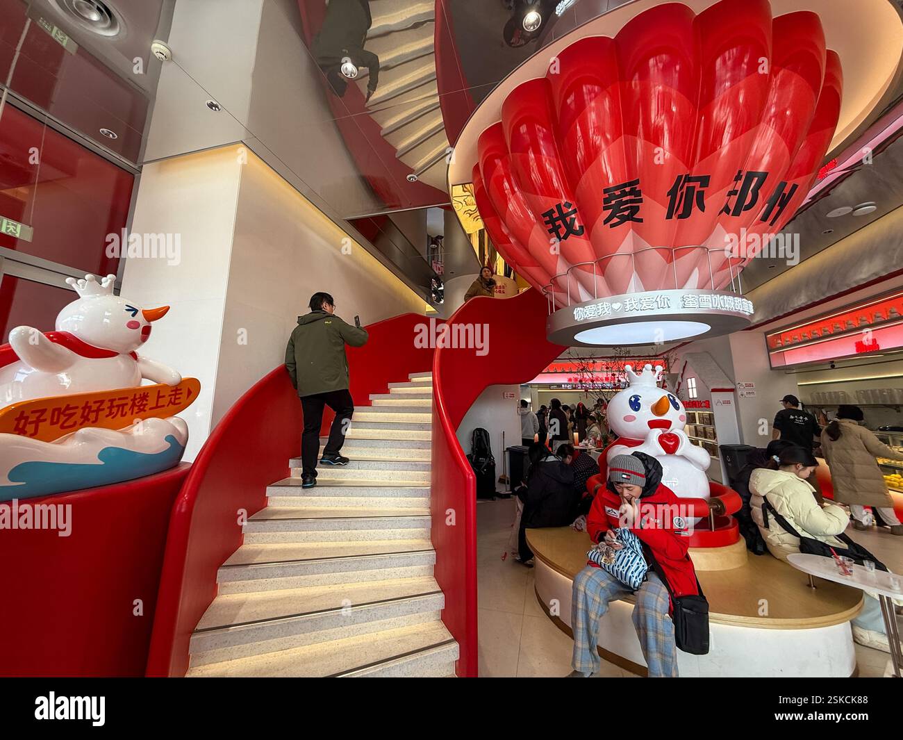 The global headquarters flagship store of Mixue Ice Cream & Tea makes ...