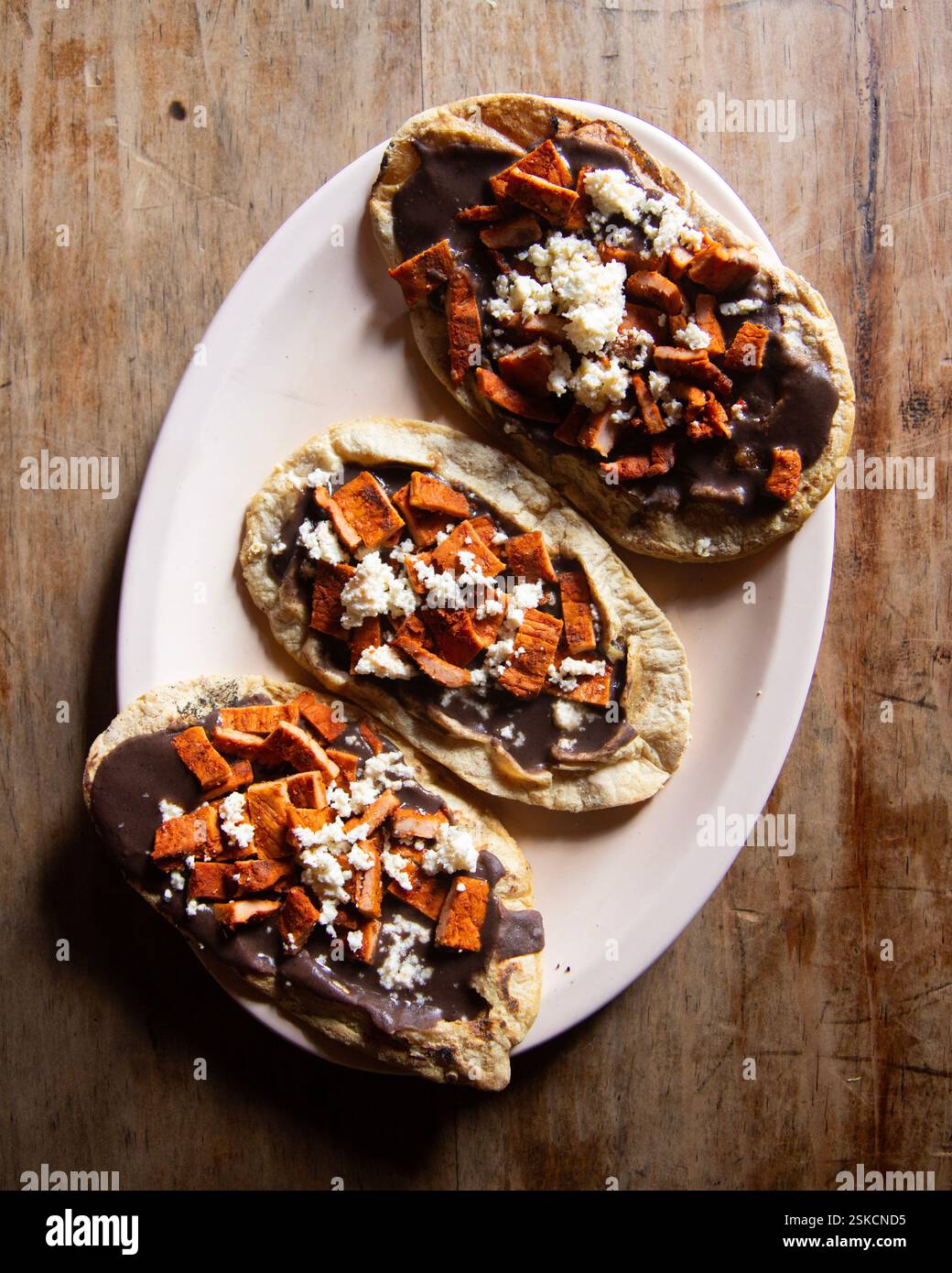 Memelas with beef jerky. Memela is an oval tortilla, made of corn dough ...
