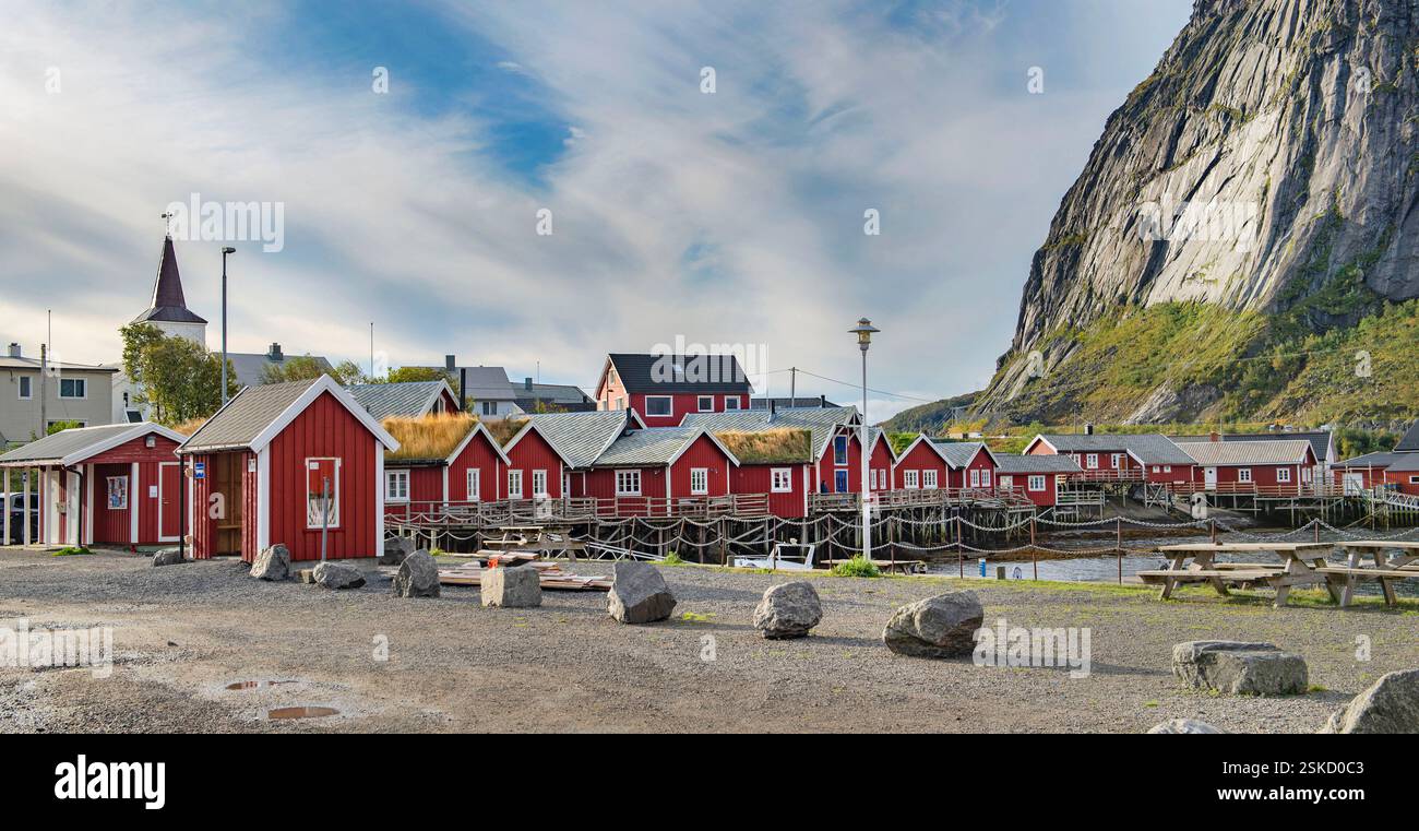 red typical cabins at the foot of a Norwegian village Reine (queen) and ...