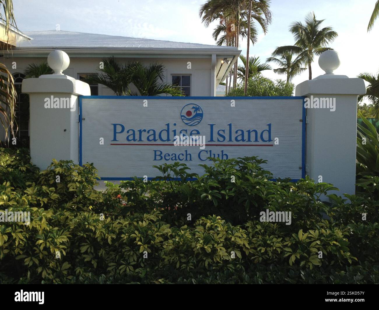 Bahamas. White sign with blue text and logo. Brick wall background ...