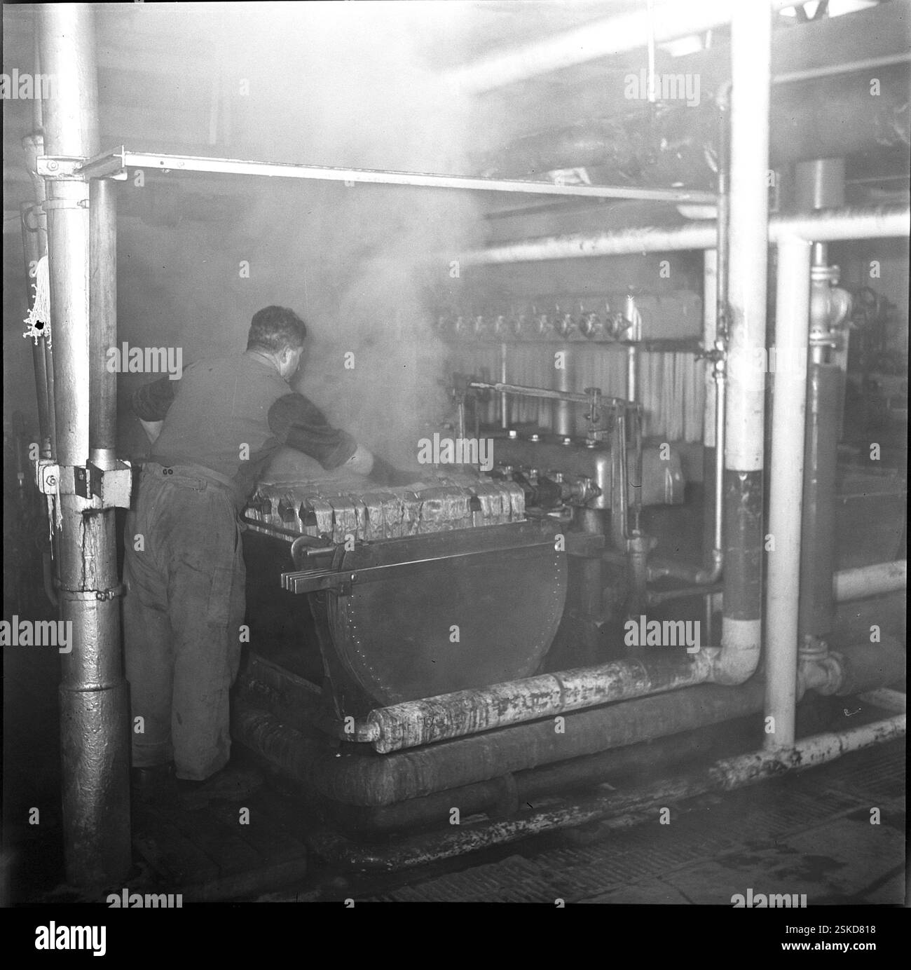 Heberlein & Co. Wattwil, Textilfabrik, Mann arbeitet in der ...