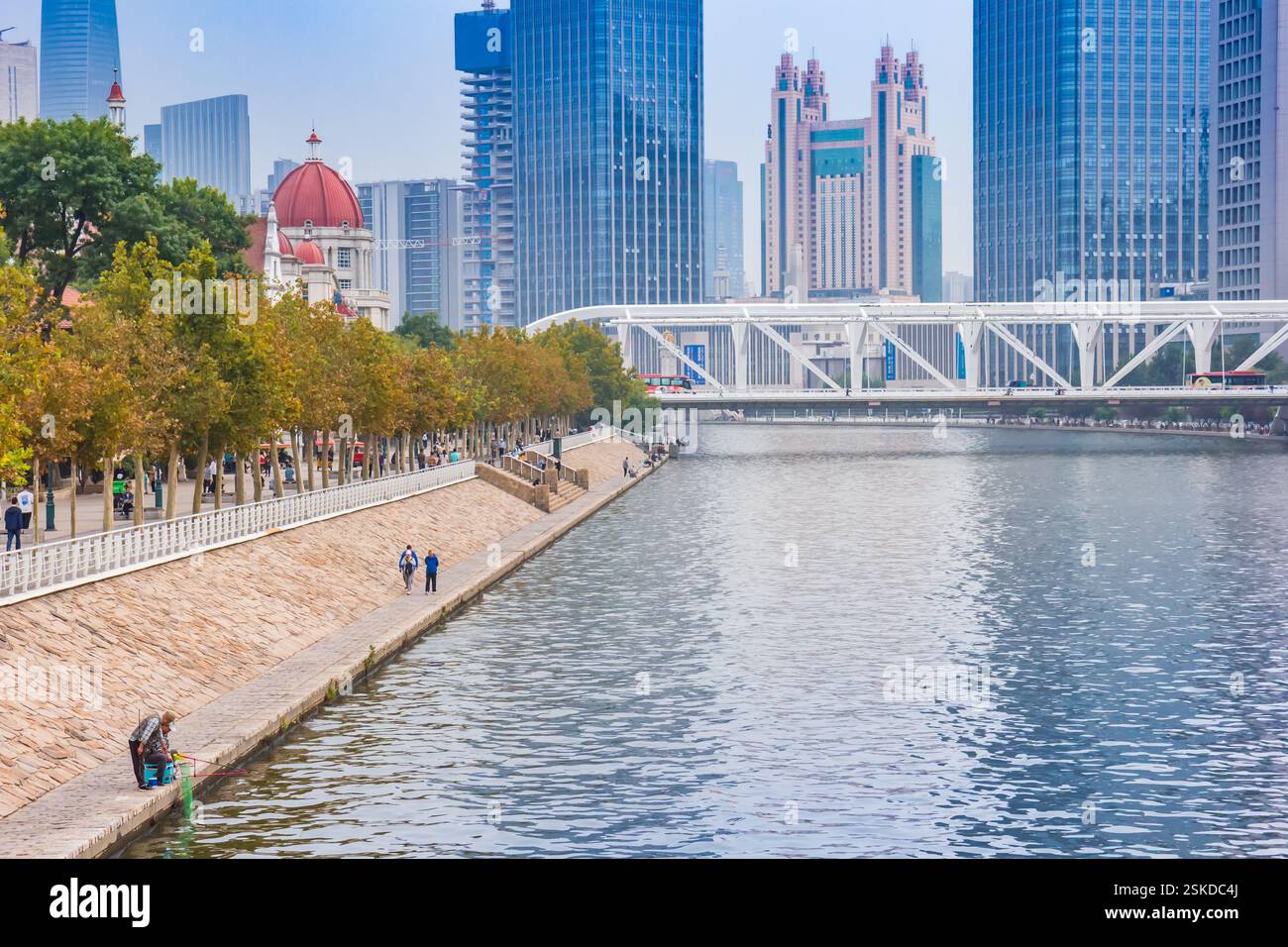 Treelined promenade along the Haihe river in Tianjin, China Stock Photo ...