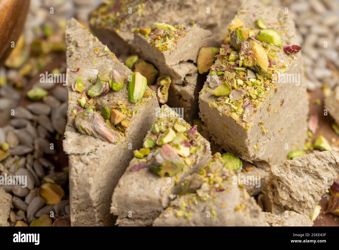 halva from sunflower seeds closeup, a sweet delicious dessert made from fried sunflower seeds ...
