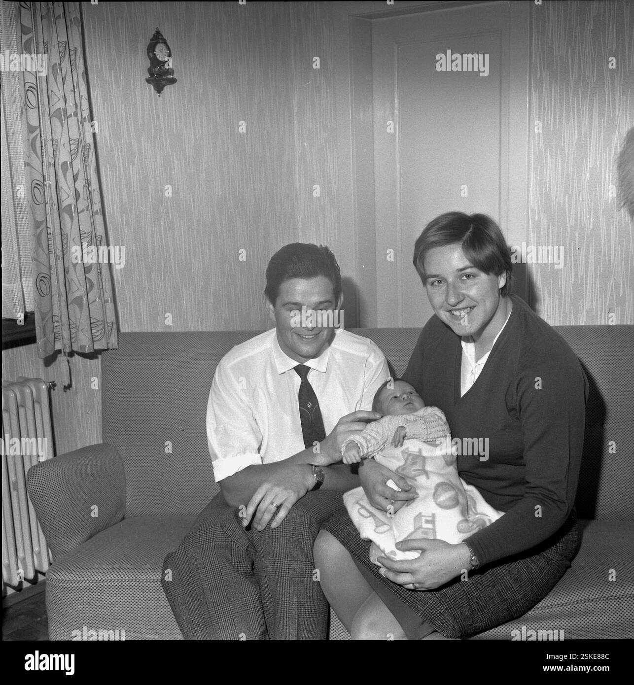 Der kleine Christian Peter Ammann ist der 10'000. Einwohner von Schlieren, 1961#With the new ...