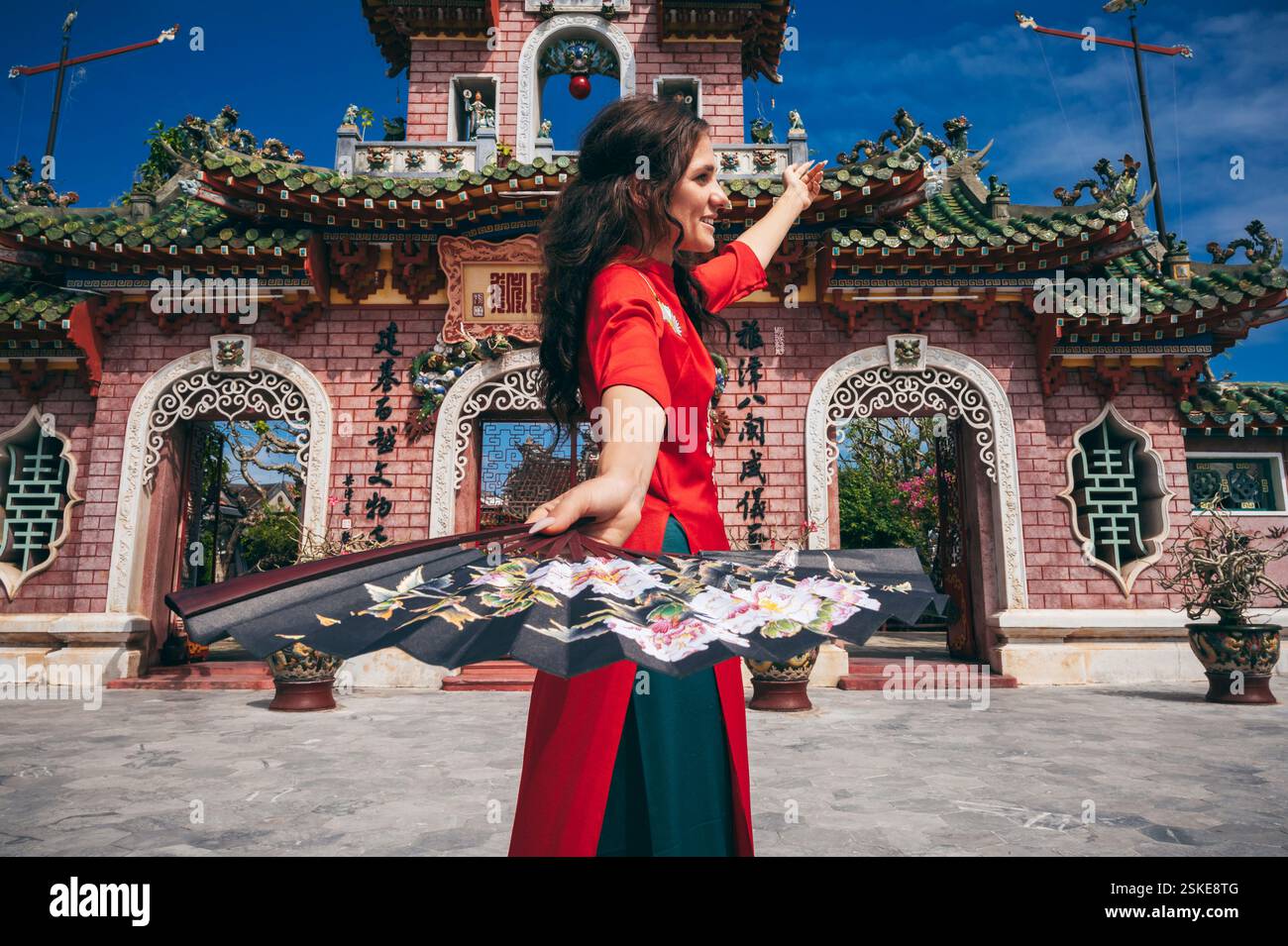 Tourist walking at Fukian Assembly Hall in the Hoi An ancient town ...