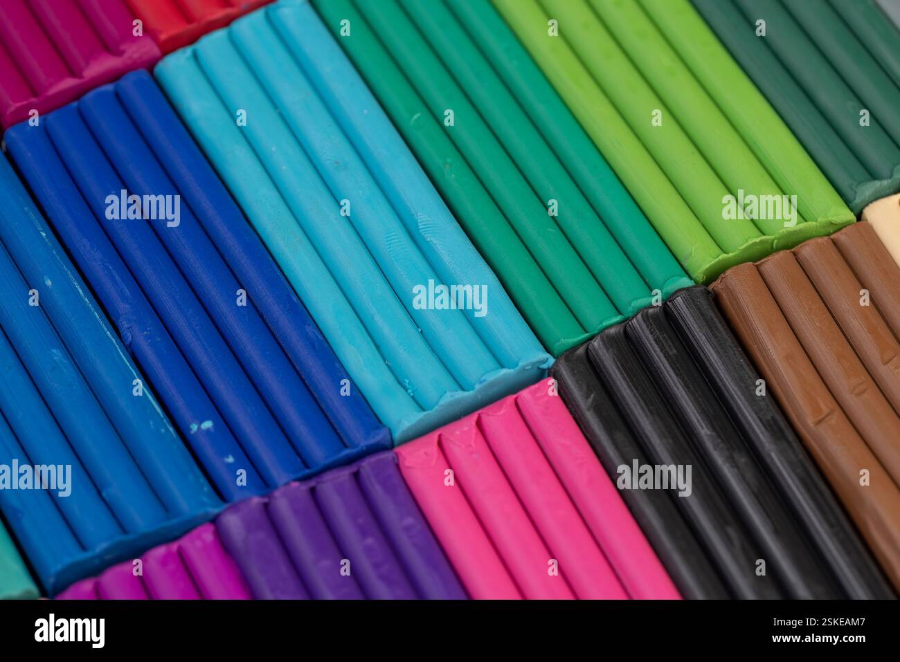 plasticine of different colors for modeling closeup, a simple colored ...