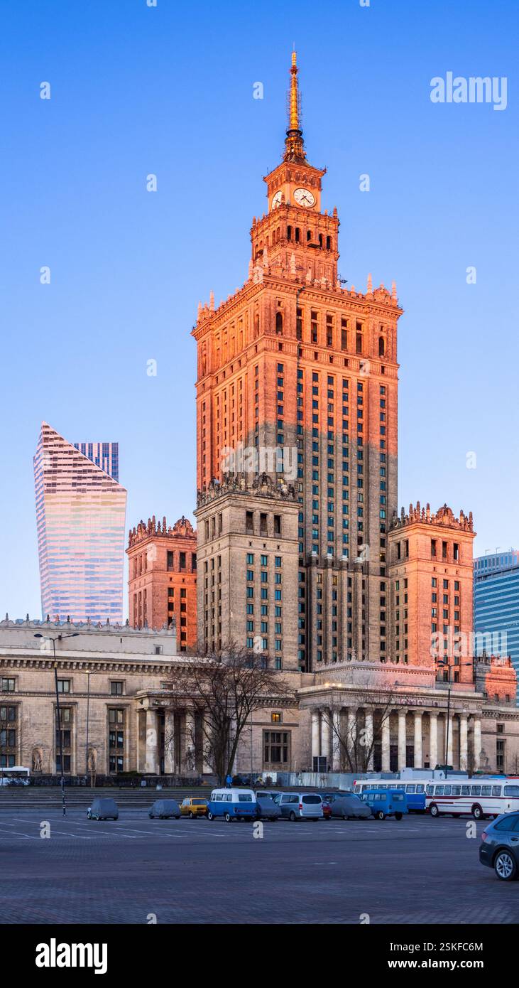 Early morning in Warsaw. The first sunlight illuminates the Palace of ...