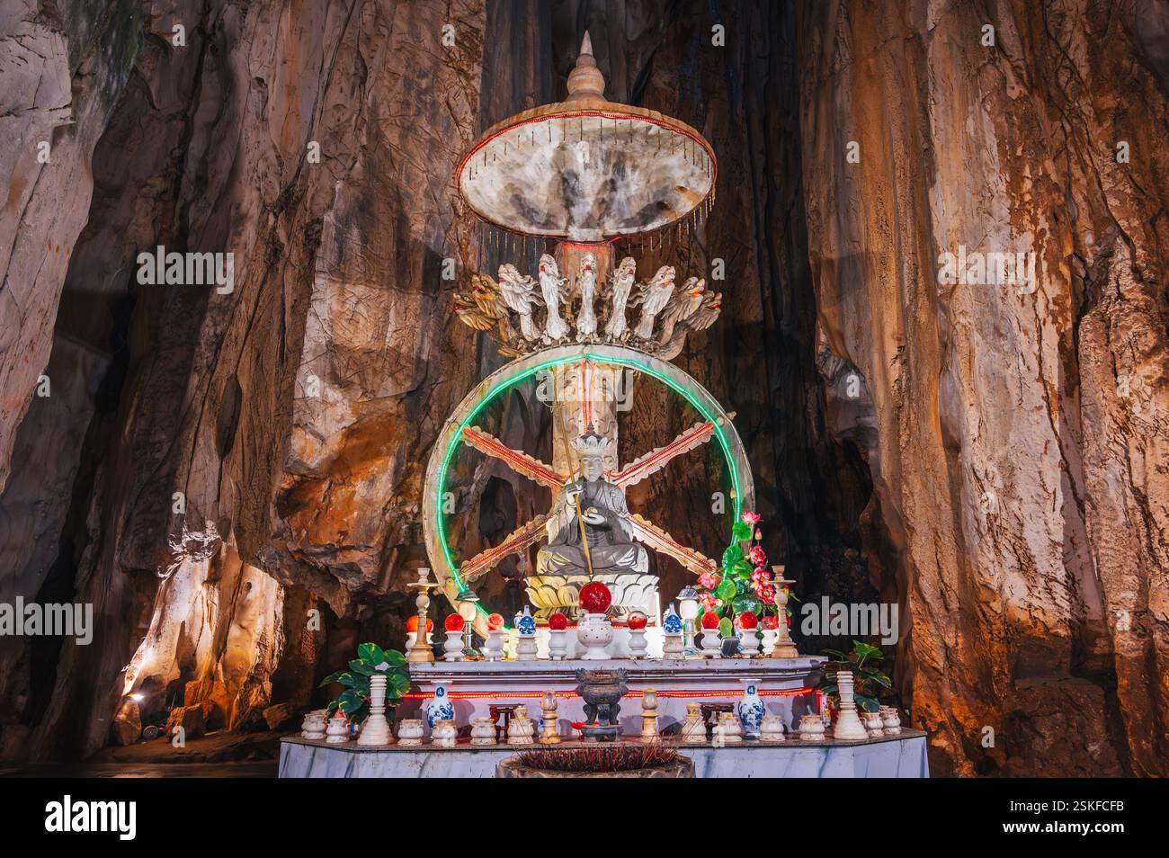 An altar inside a temple in the Marble Mountains in Da Nang Stock Photo ...