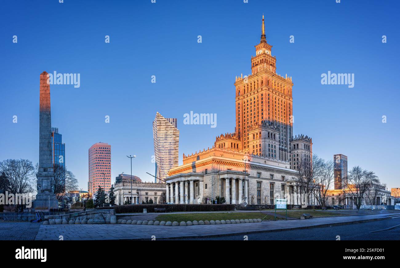 Early morning in Warsaw. The first sunlight illuminates the Palace of ...