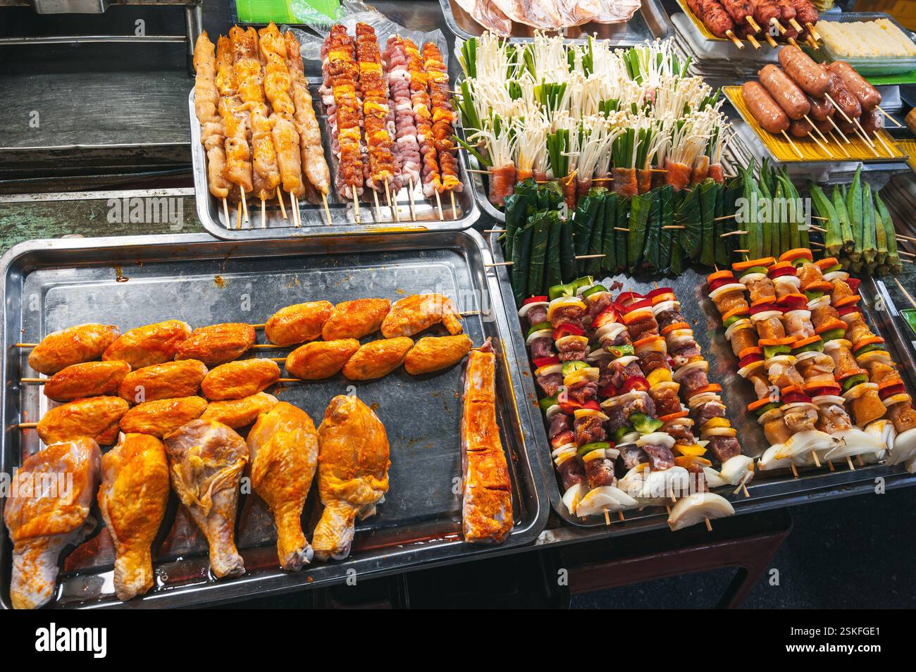 Fish and meat mix barbecue close up in South East Asian food market ...