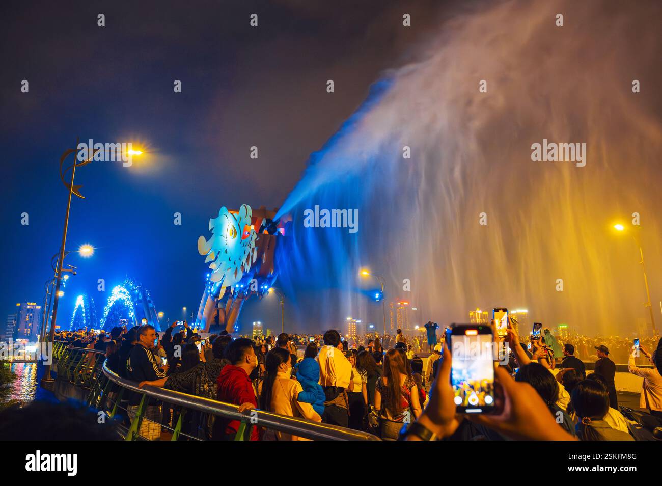 A stream of water from the dragon's head on the Dragon Bridge, the ...