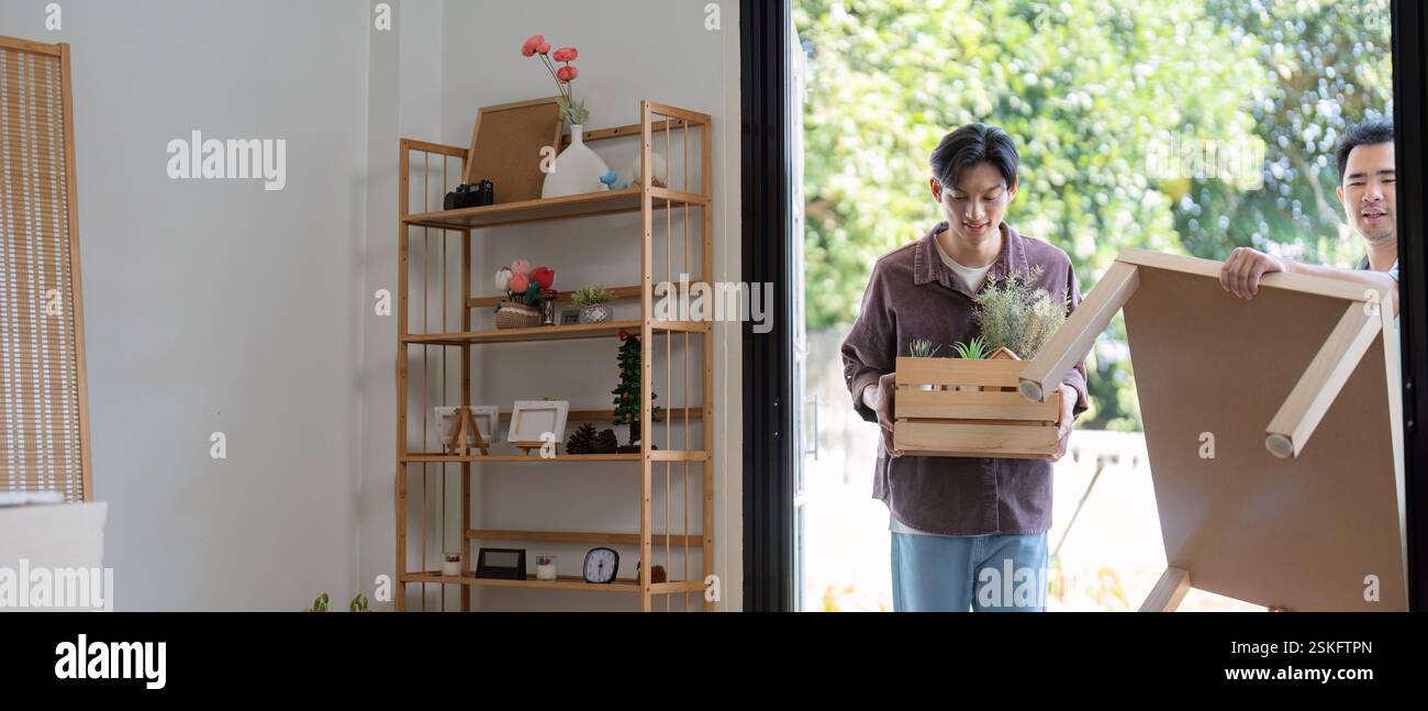 LGBTQ couple moving in together, sharing moments of joy and teamwork ...