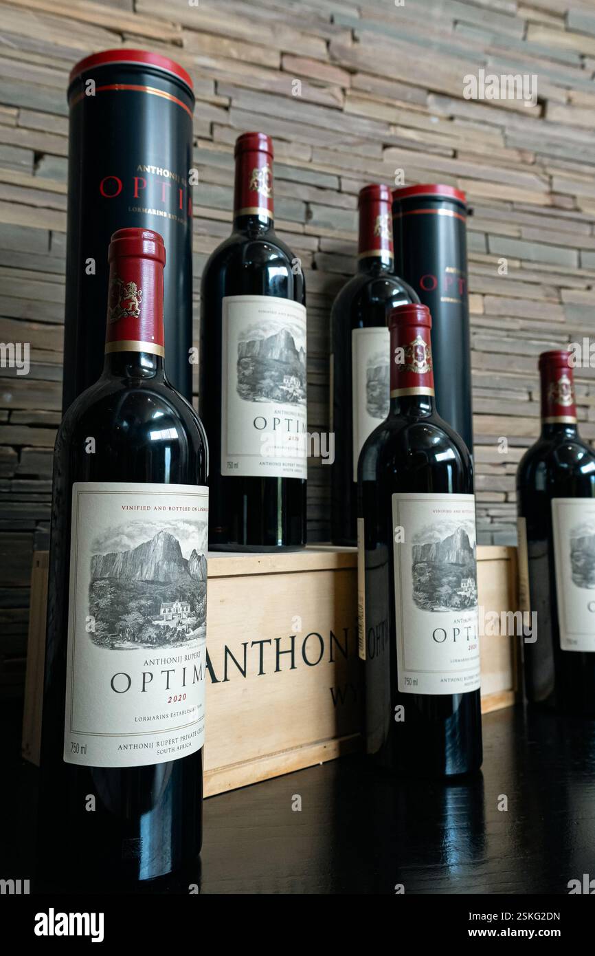 Exhibition hall with bottles of wine from different collections at the ...