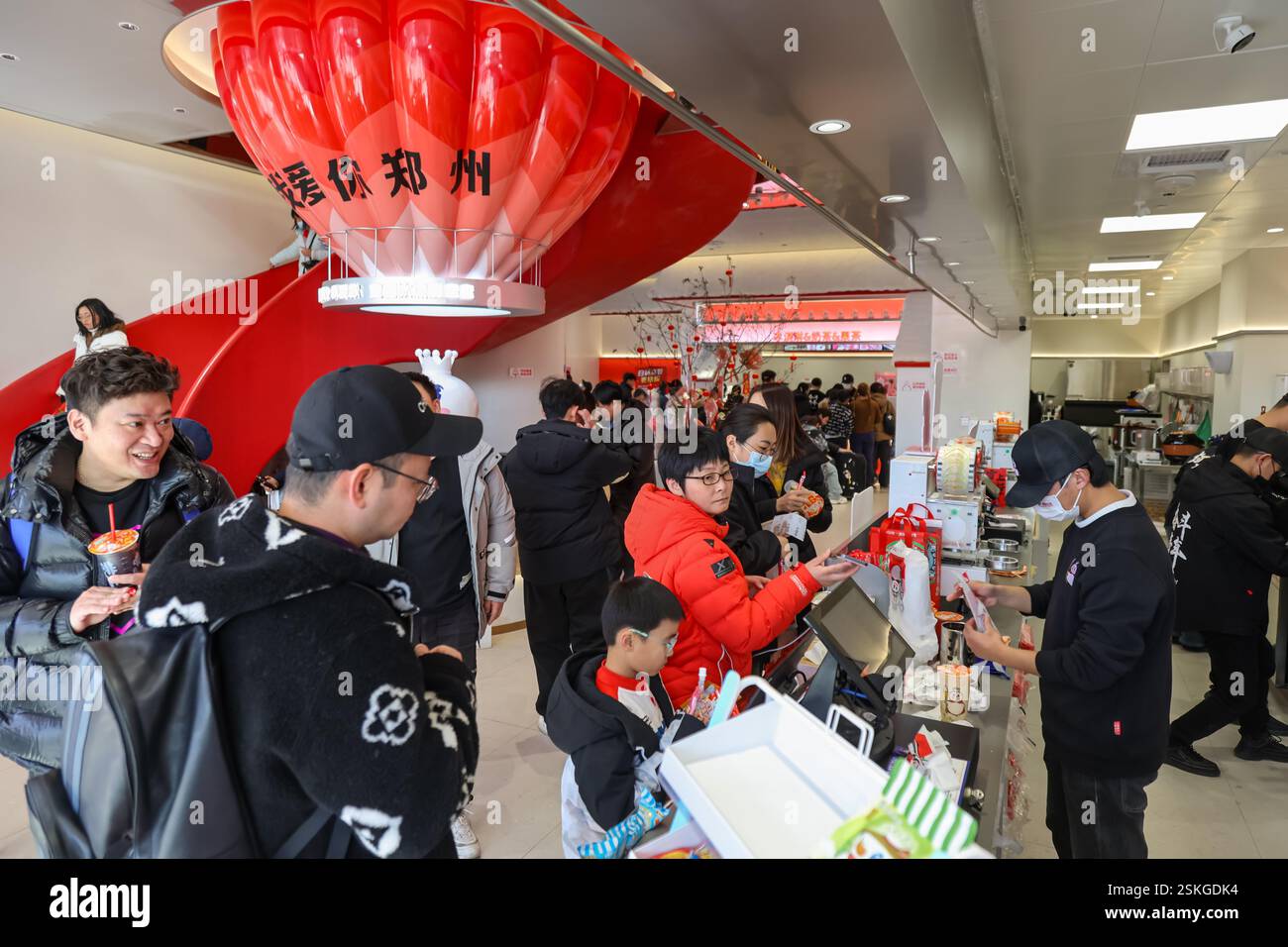 Customers flock to the global headquarters flagship store of Mixue Ice ...