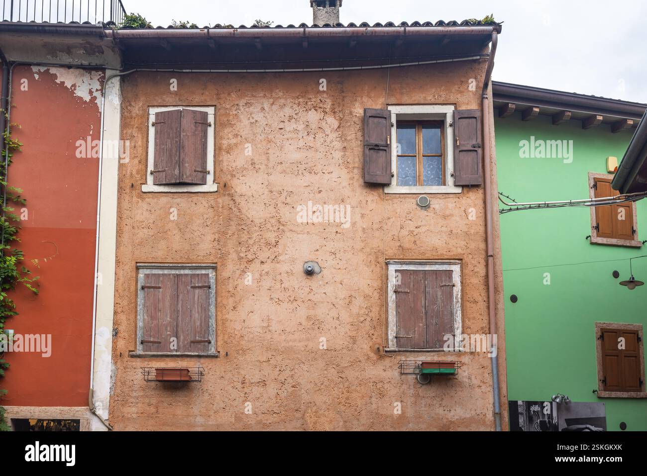 Colorfull houses in a street of the Malcesine, town on the shore of ...