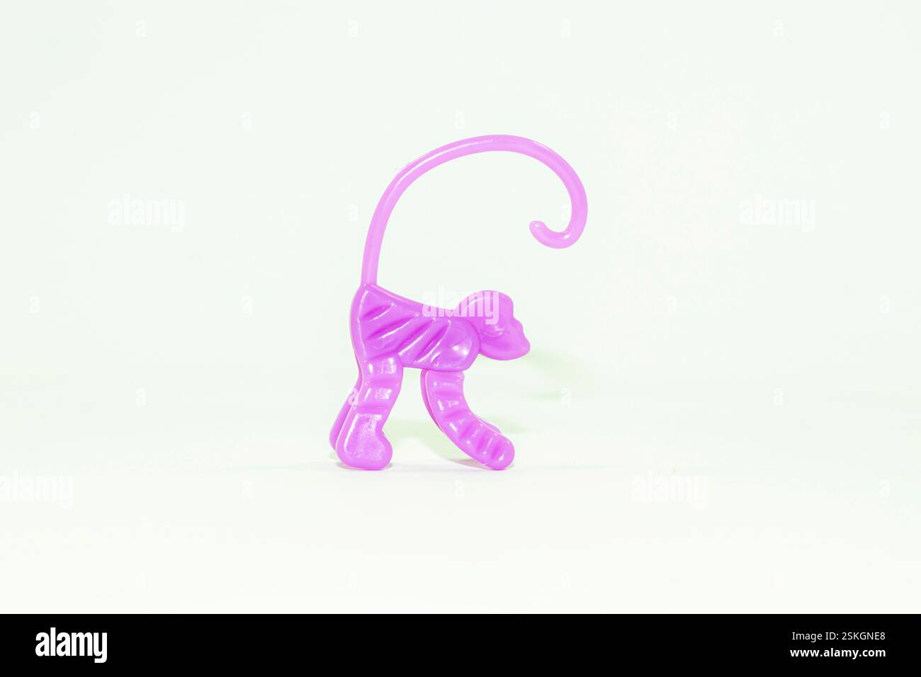 Here is a purple monkey toy. The toy is made of plastic, which children ...