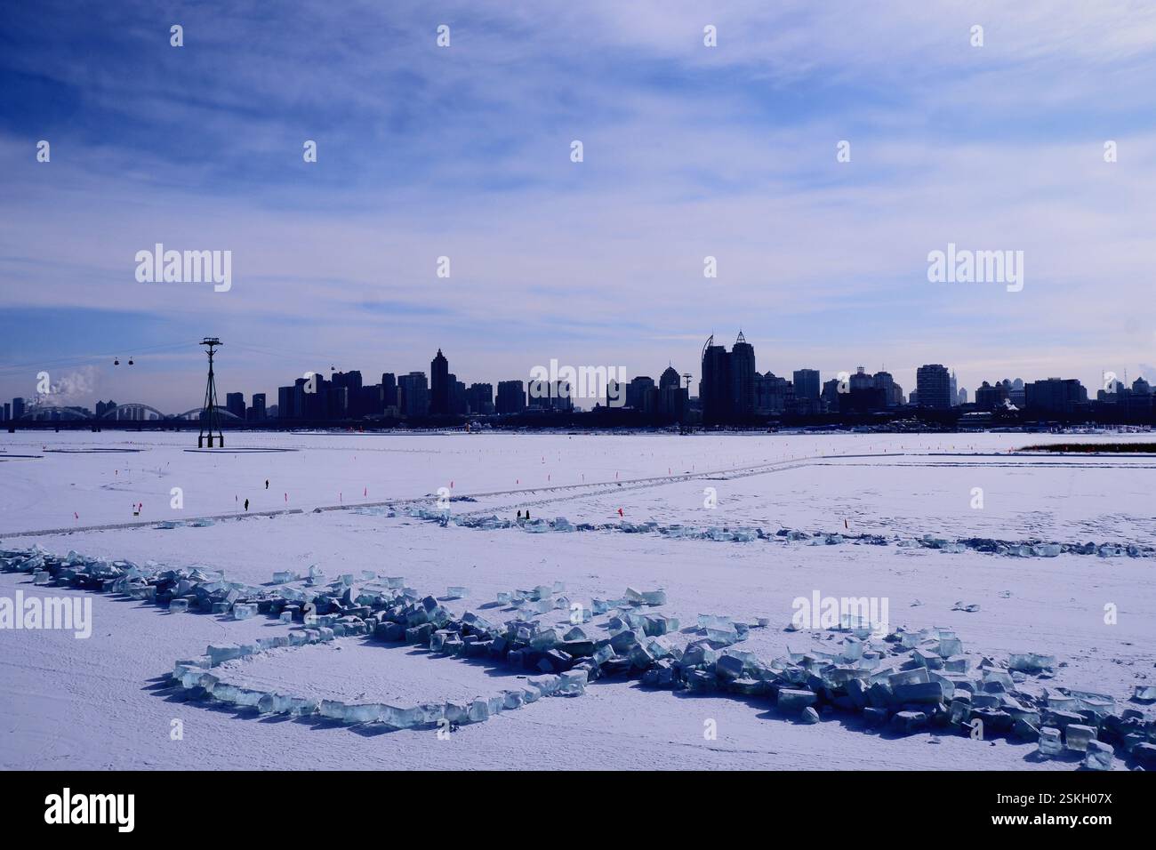 Aerial photo show the snow-covered Songhua River in Harbin City ...
