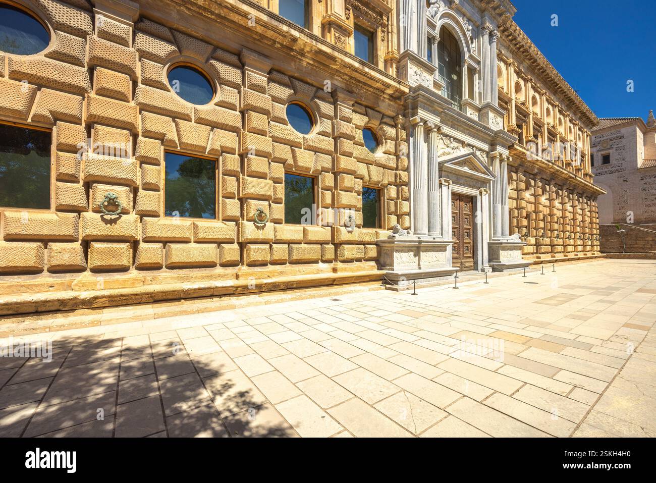 A large building exhibits a classical aesthetic, defined by its ...