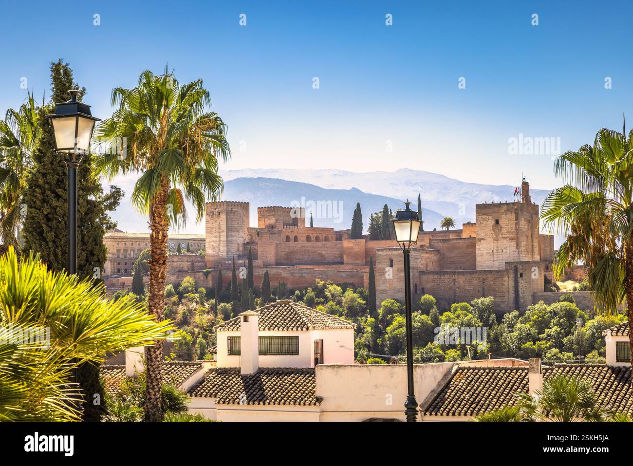 The Alhambra palace from viewpoint in Granada town in Spain. Historic ...