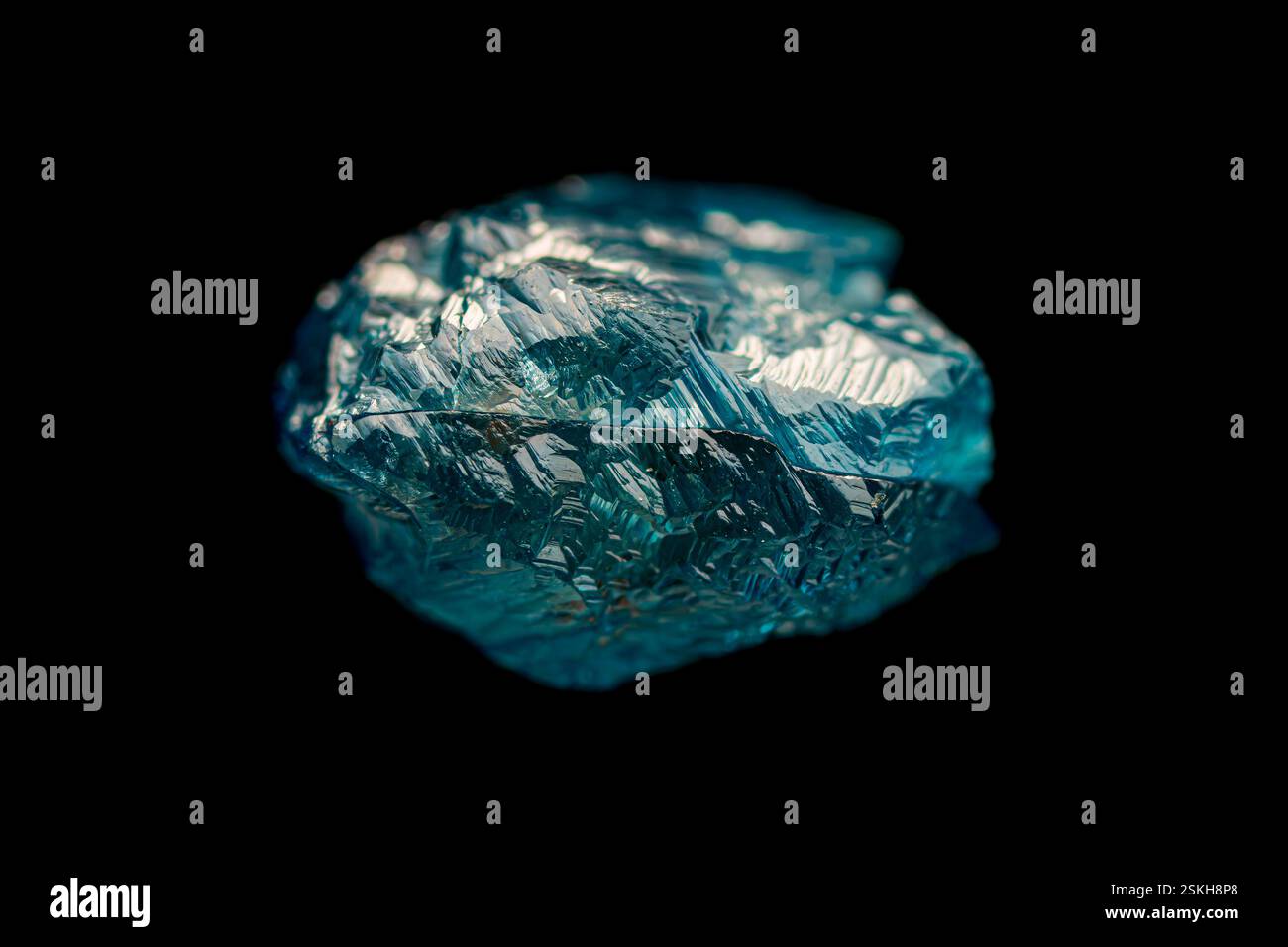 Natural rough uncut blue diamond crystal on dark background Stock Photo ...