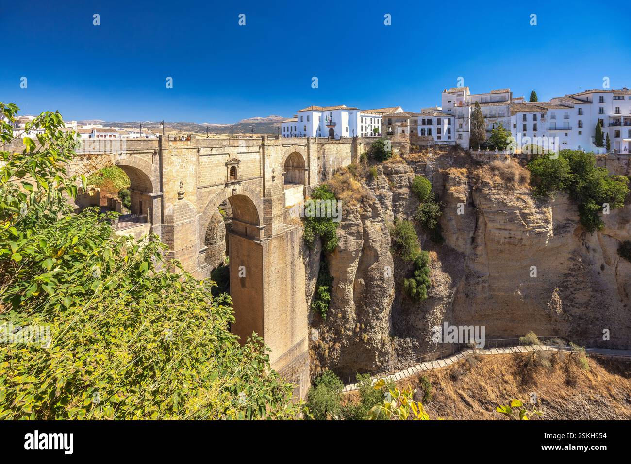 The Puente Nuevo bridge in El Tajo gorge in Ronda town in Spain ...