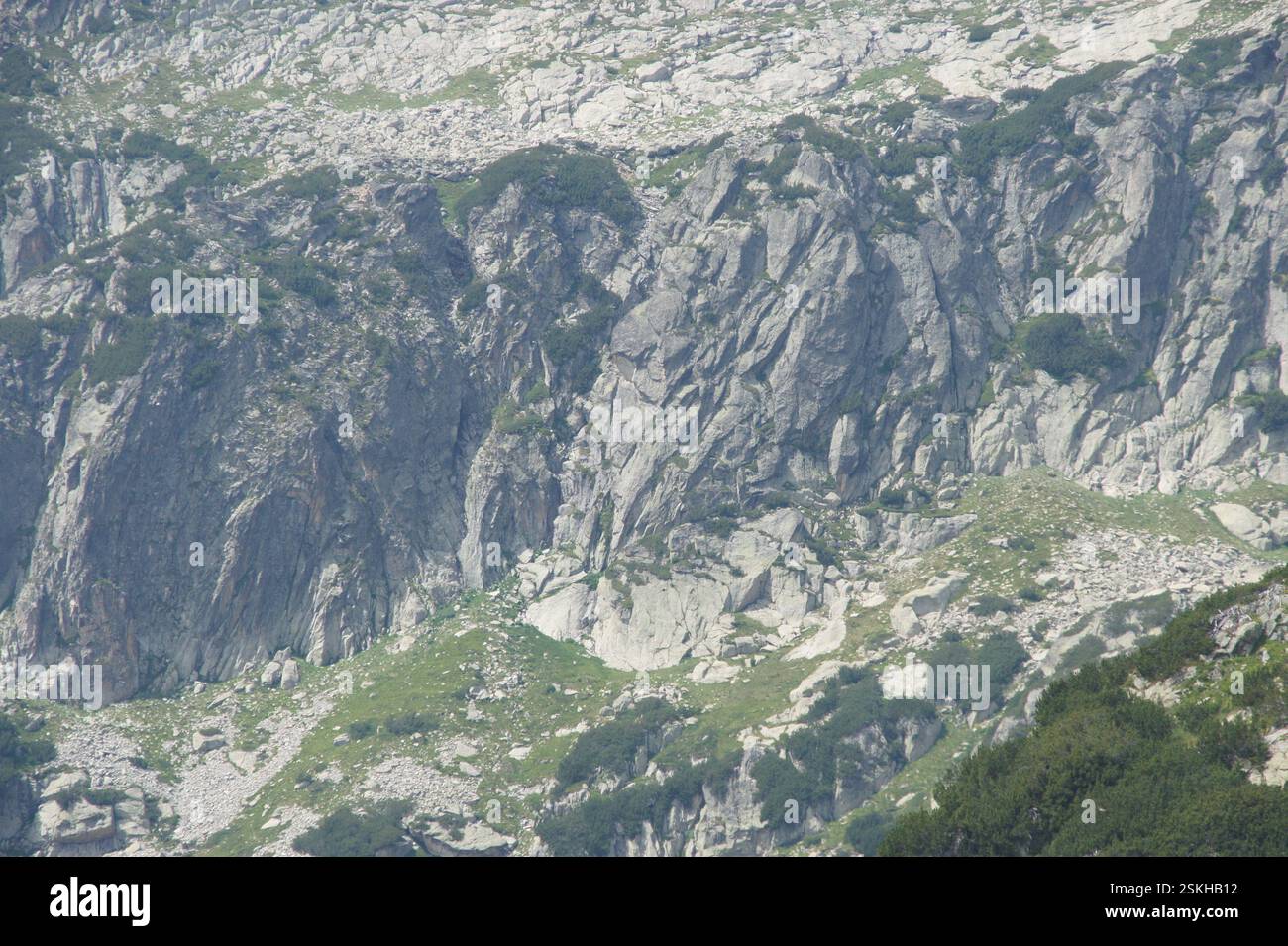 The photo shows a Rocky mountain landscape in BULGARIA. Jagged cliffs ...