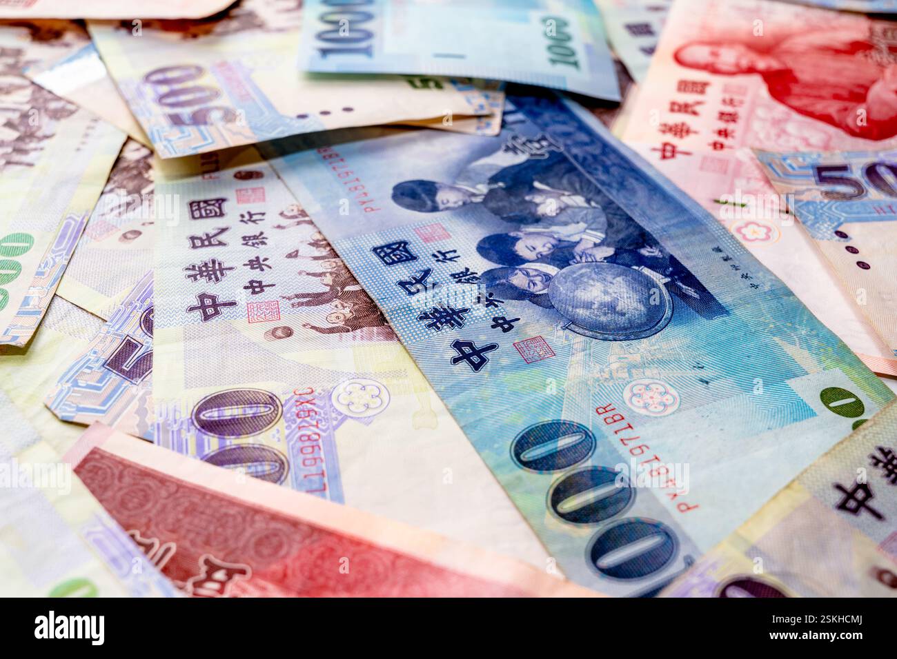 A Large Spread Of New Taiwan Dollar Banknotes Representing Wealth And