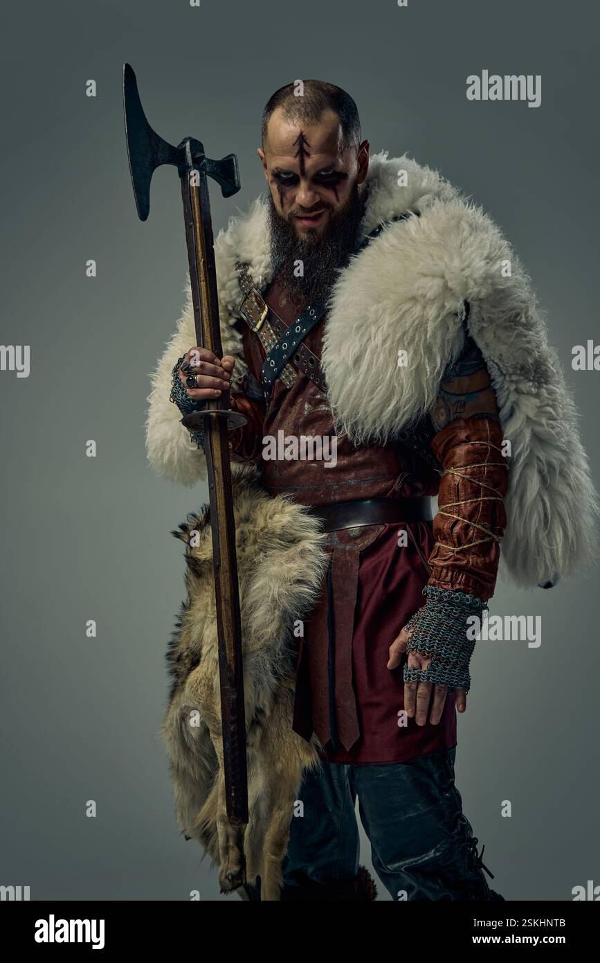 Portrait of determined man with fierce gaze, medieval Viking, warrior ...