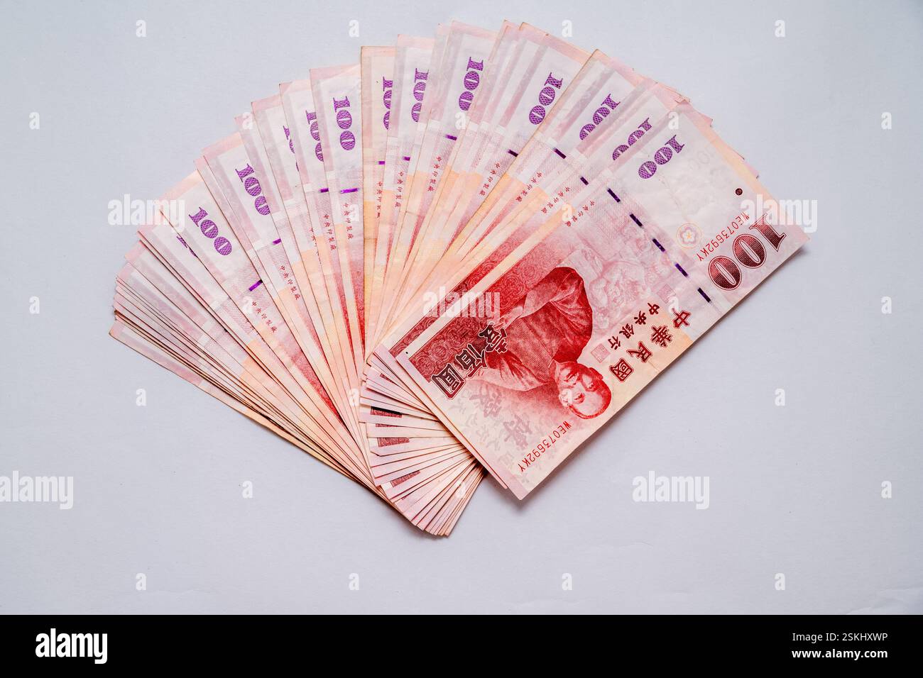 Large Stack of New Taiwan Dollar 100 Banknotes, Symbolizing Financial ...