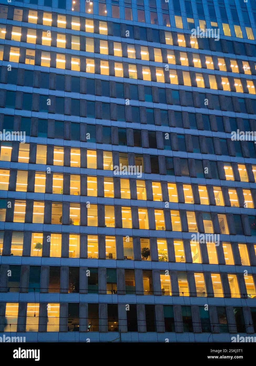 Tall office building in the center of The Hague, Netherlands is lit ...