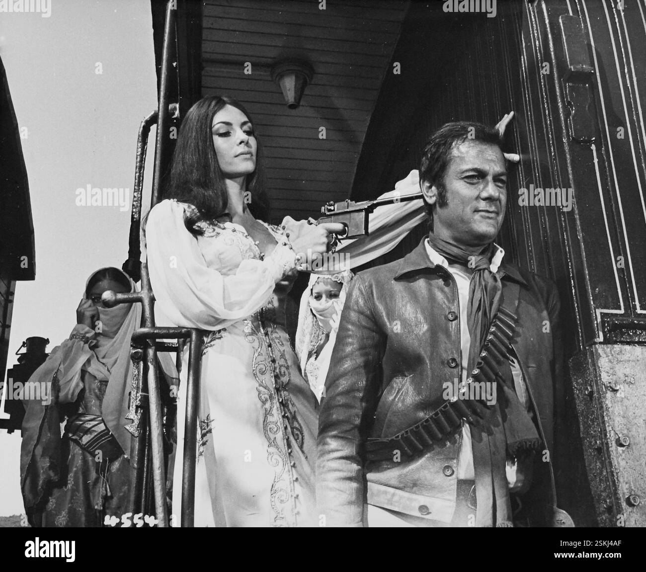 Michele Mercier, Tony Curtis in "You Can't Win 'Em All" Michele Mercier ...