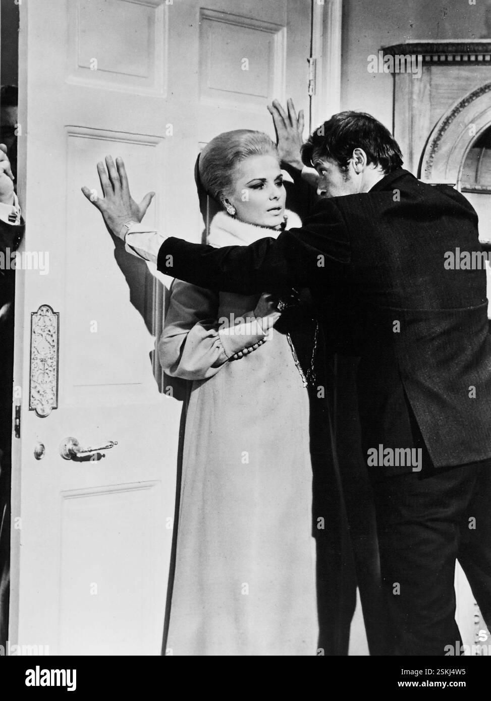 Martha Hyer, Roger Moore in "Crossplot" 1969#Martha Hyer, Roger Moore ...