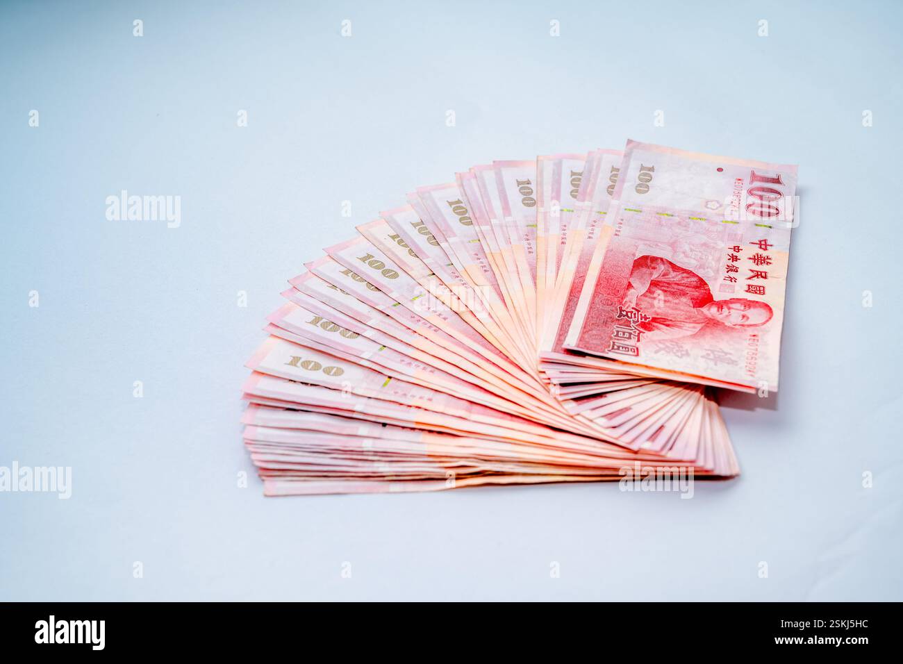 Large Stack of New Taiwan Dollar 100 Banknotes, Symbolizing Financial ...