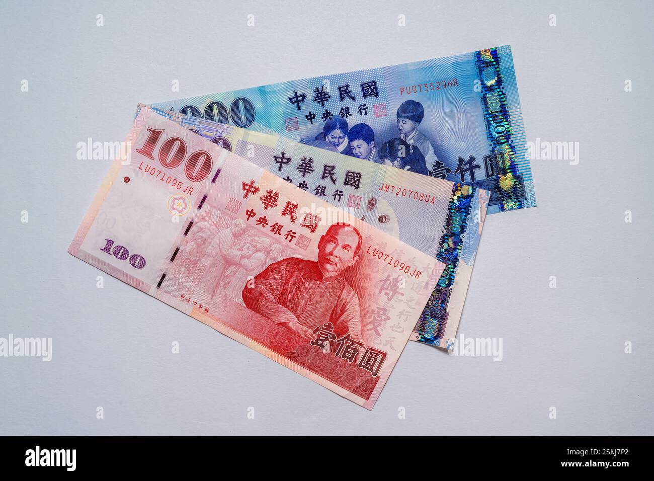 A Large Spread of New Taiwan Dollar Banknotes, Representing Wealth and ...