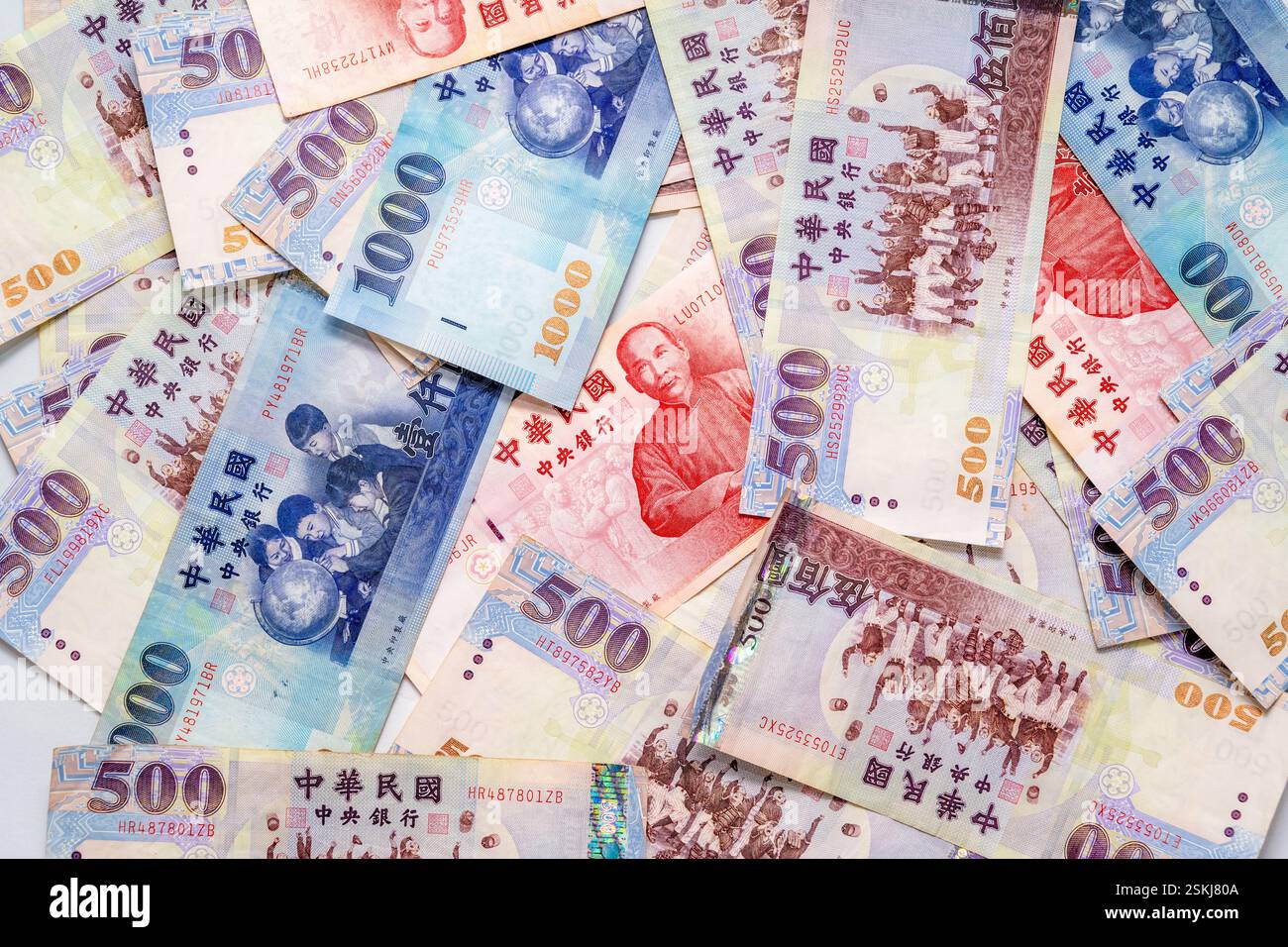A Large Spread of New Taiwan Dollar Banknotes, Representing Wealth and ...