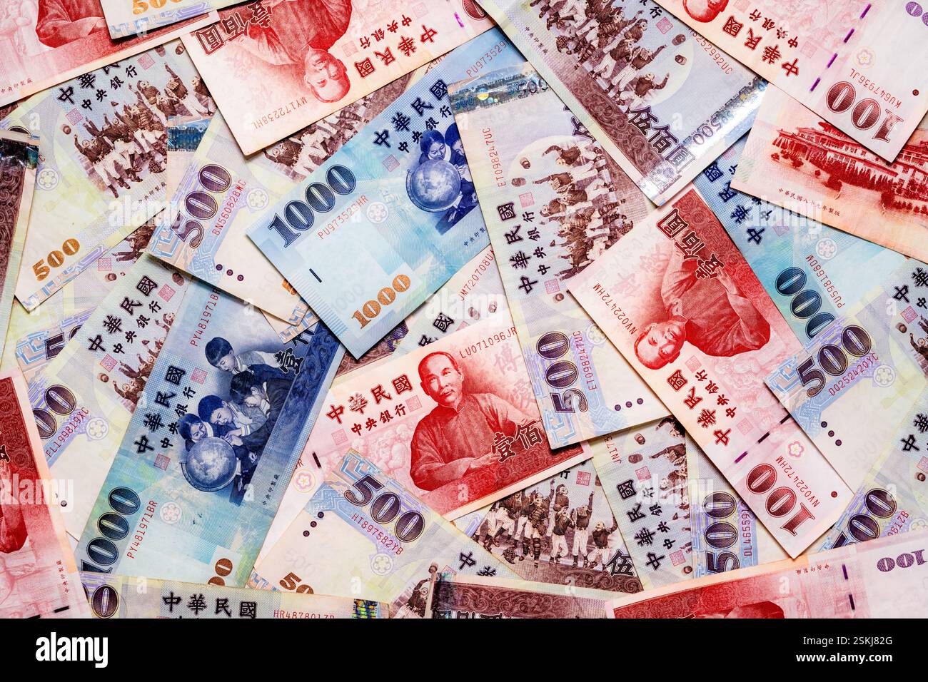 A Large Spread of New Taiwan Dollar Banknotes, Representing Wealth and ...