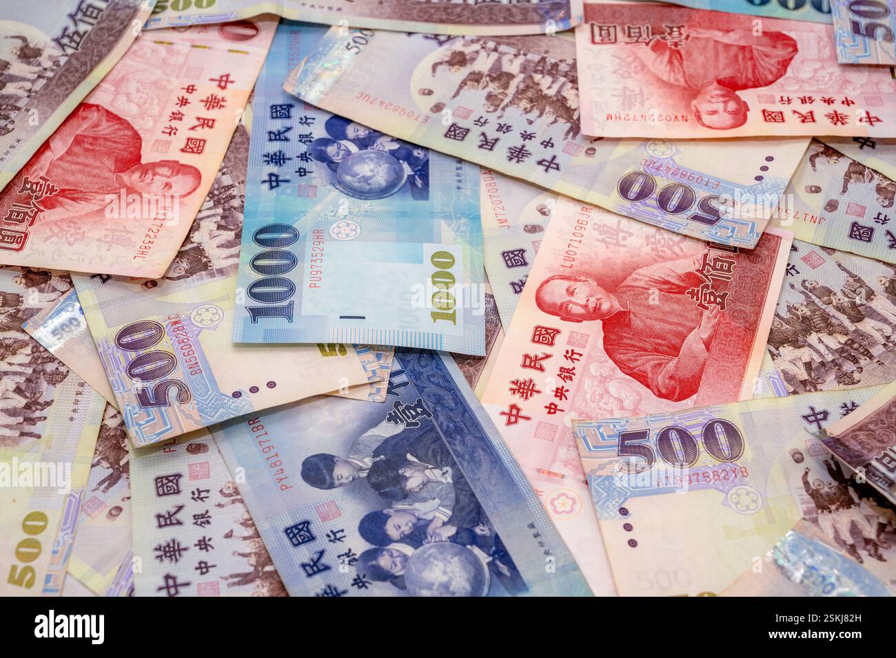 A Large Spread of New Taiwan Dollar Banknotes, Representing Wealth and ...