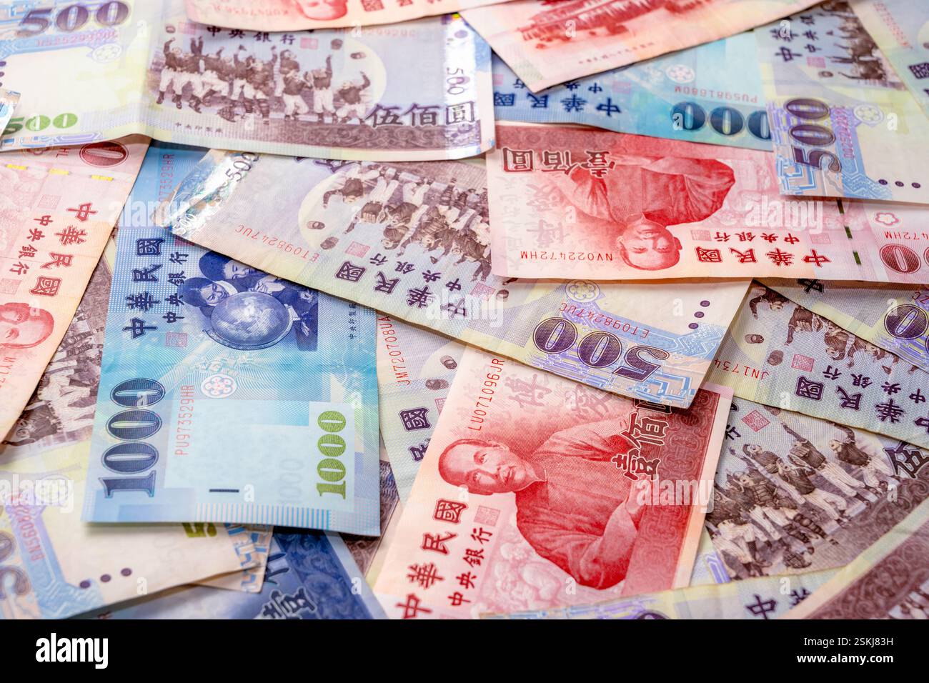 A Large Spread of New Taiwan Dollar Banknotes, Representing Wealth and ...