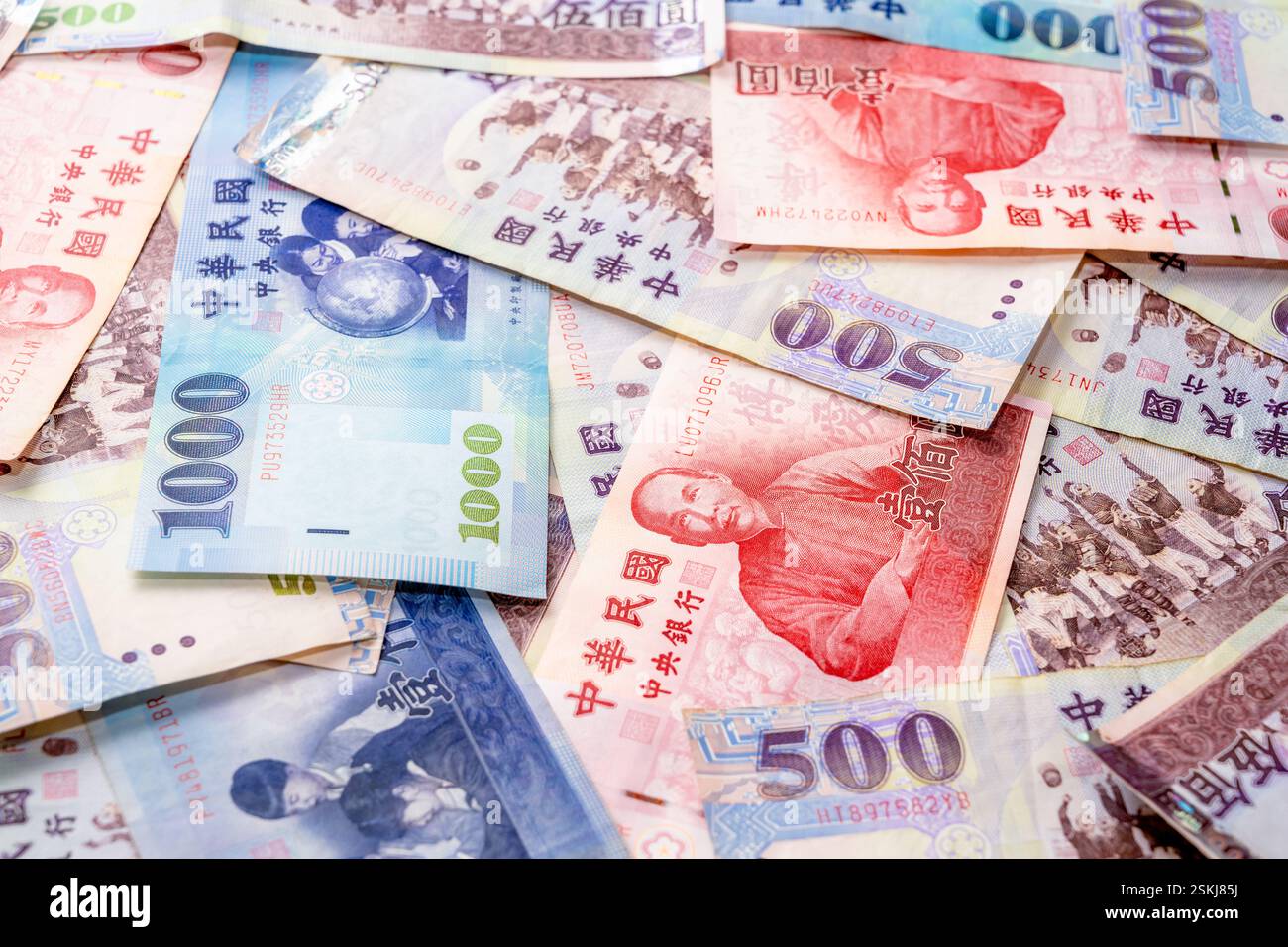 A Large Spread of New Taiwan Dollar Banknotes, Representing Wealth and ...
