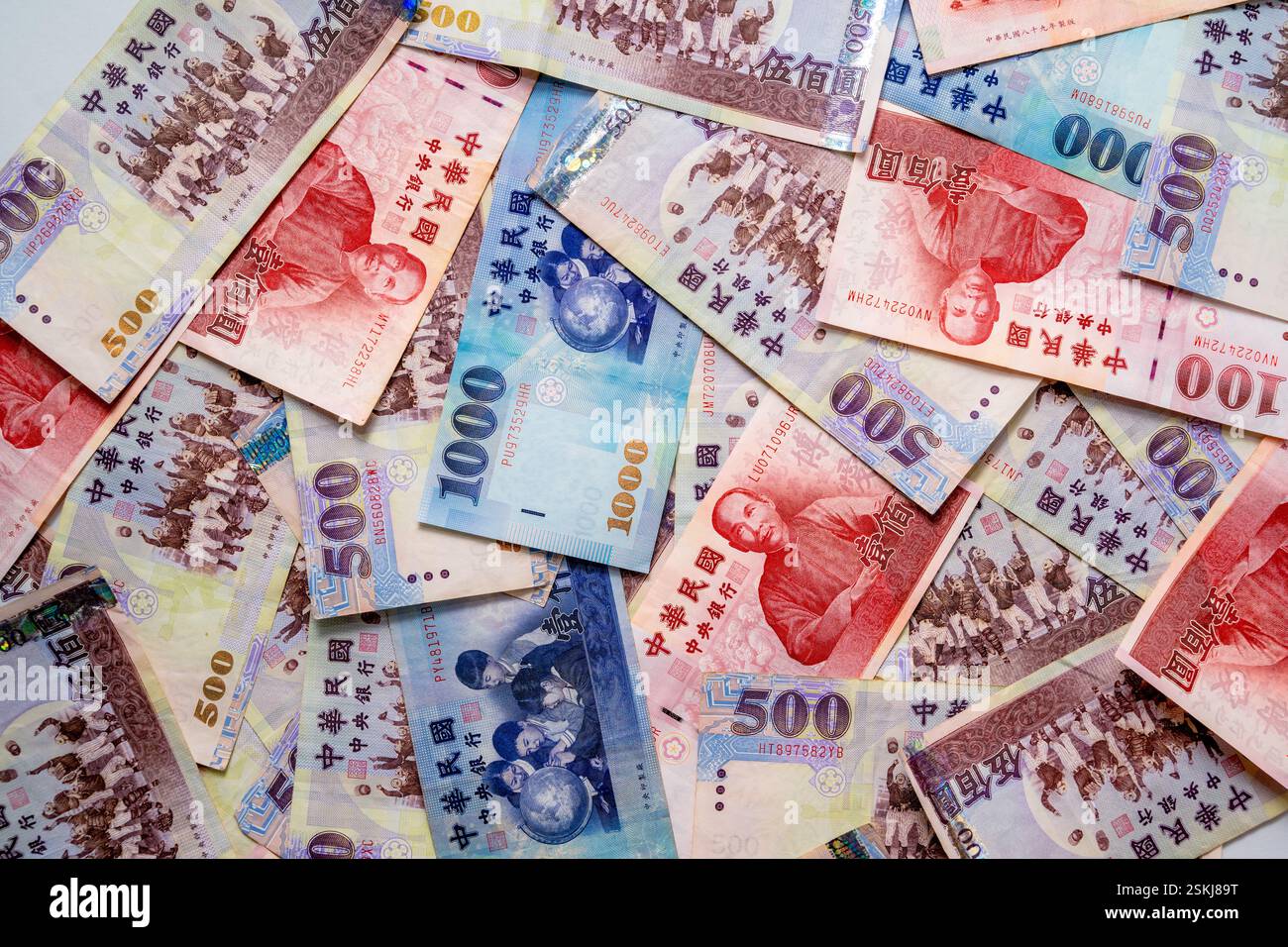 A Large Spread of New Taiwan Dollar Banknotes, Representing Wealth and ...