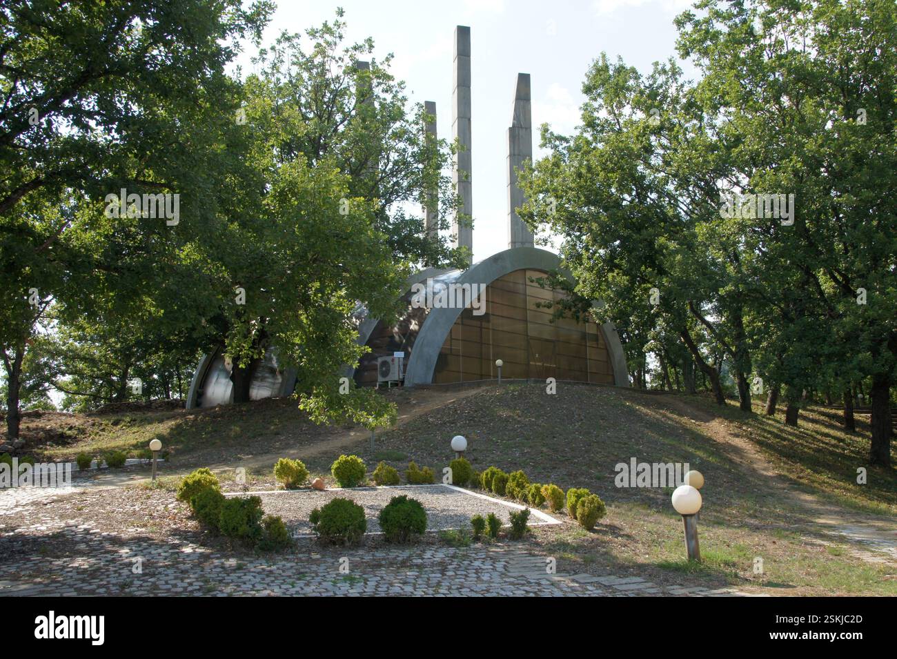 Monument. Concrete pillars and curved roof. BULGARIA. Memorial to ...