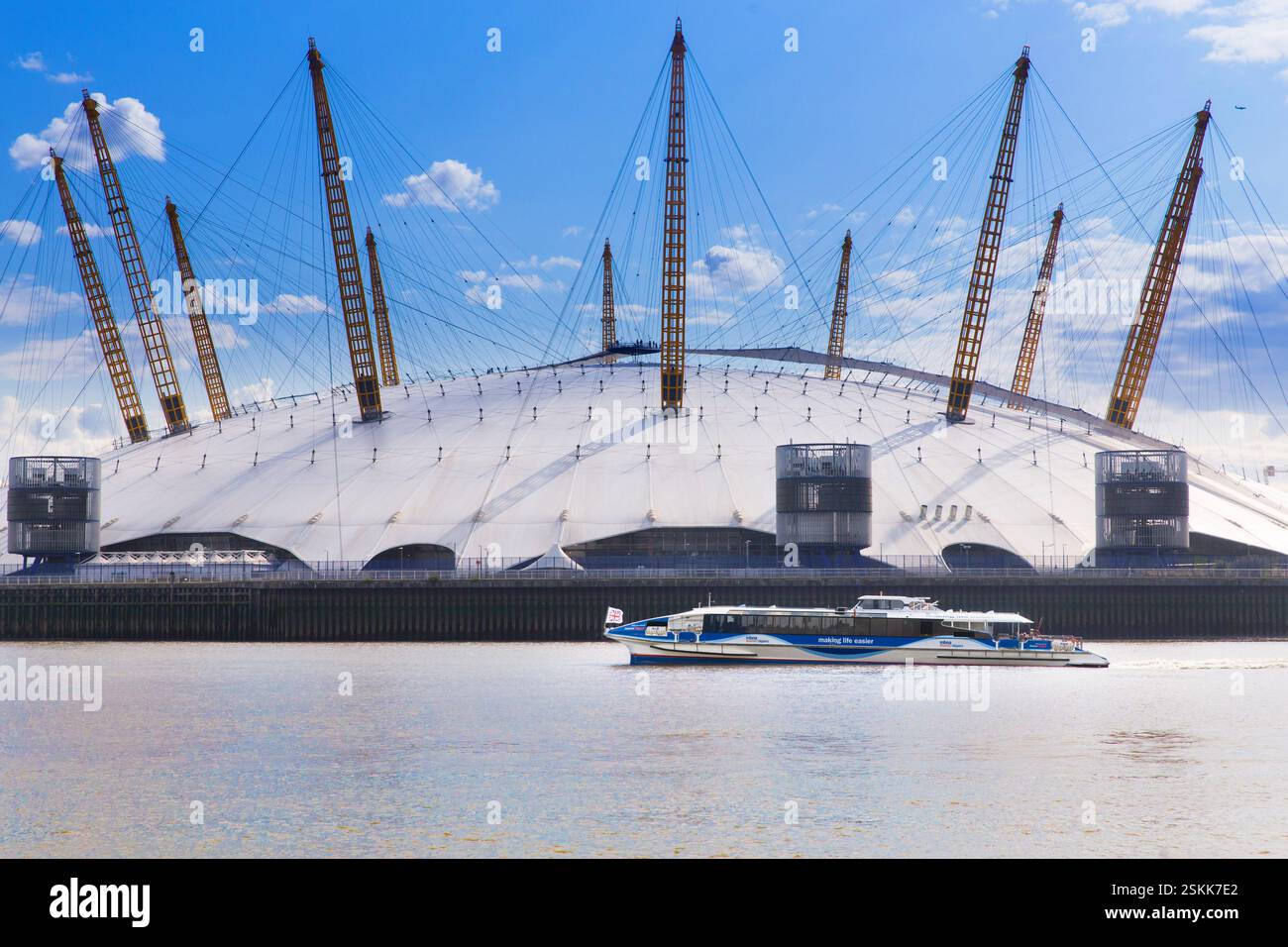 The O2 Arena in London, UK, with a river boat on the Thames. A public ...