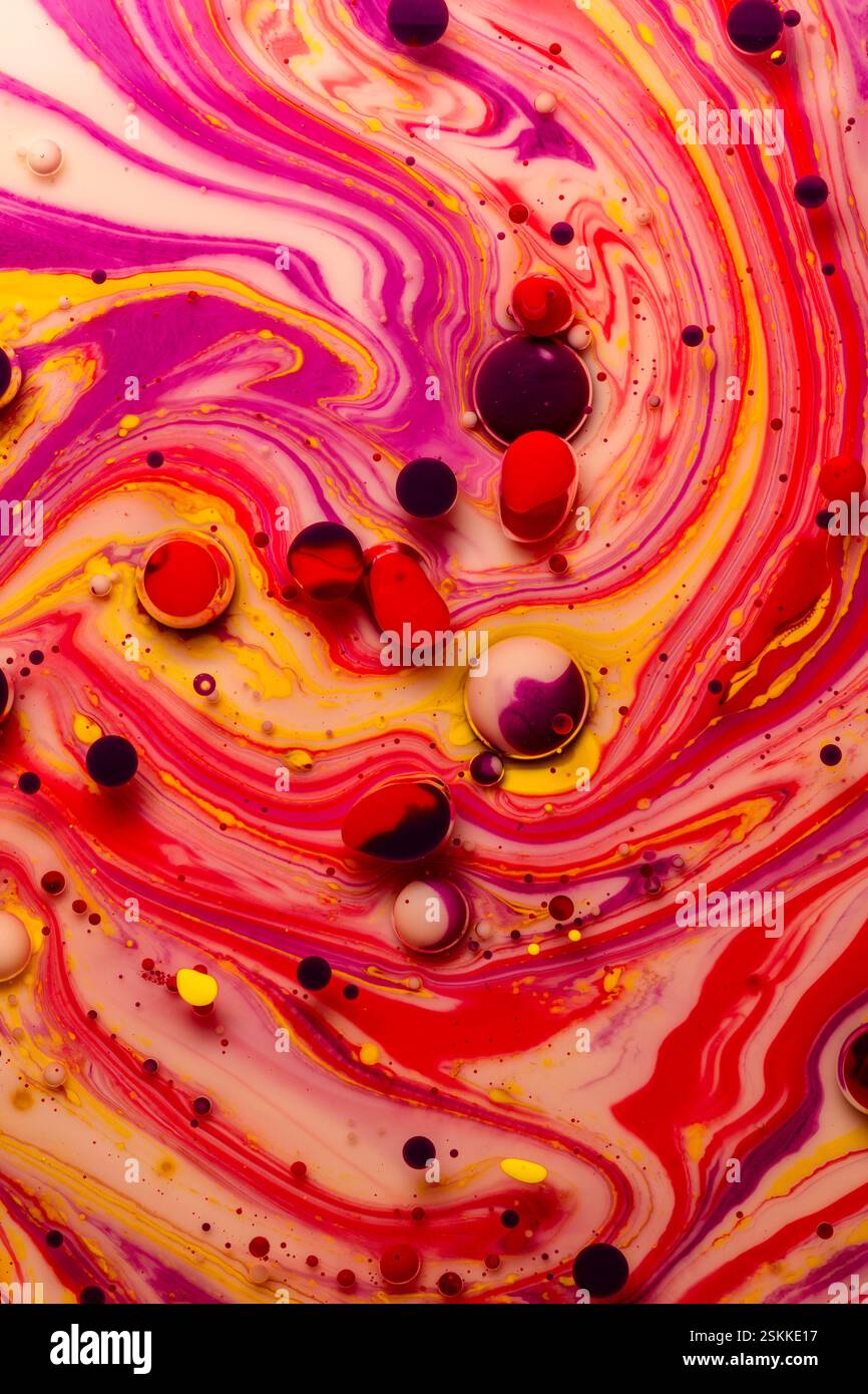 Stunning creative macro abstract still-life of colour infused milk and ...
