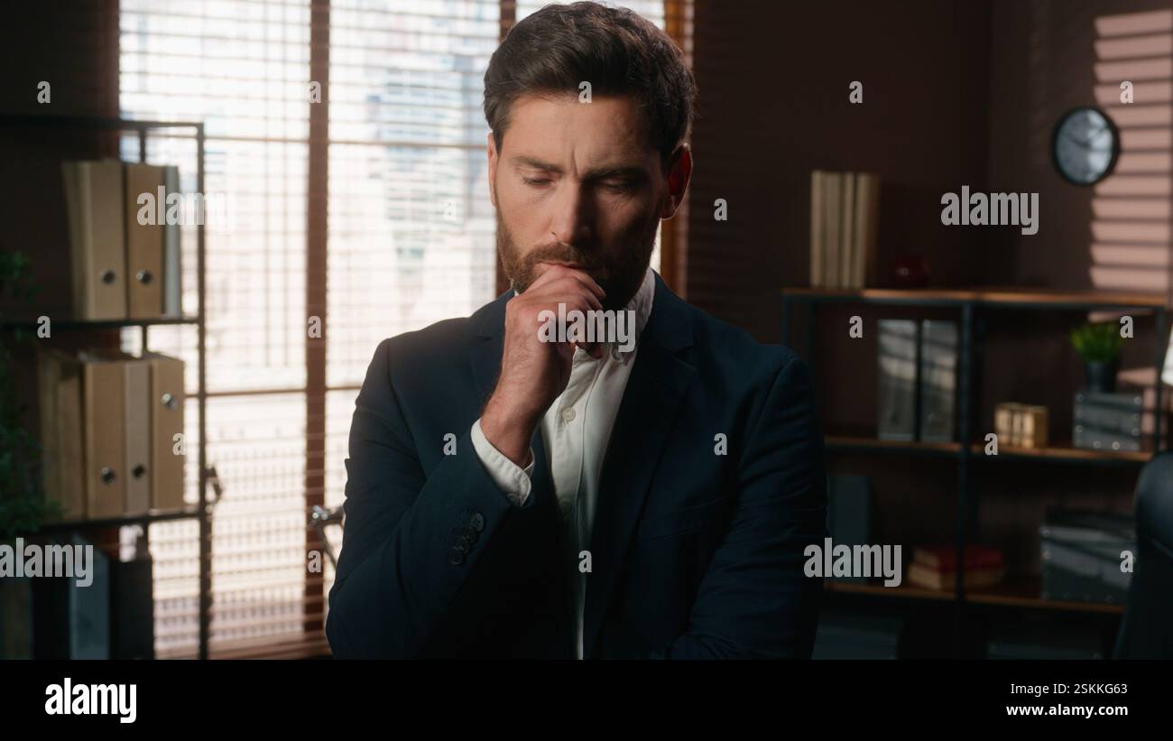 Thinking pensive puzzled serious Caucasian middle-aged business man ...