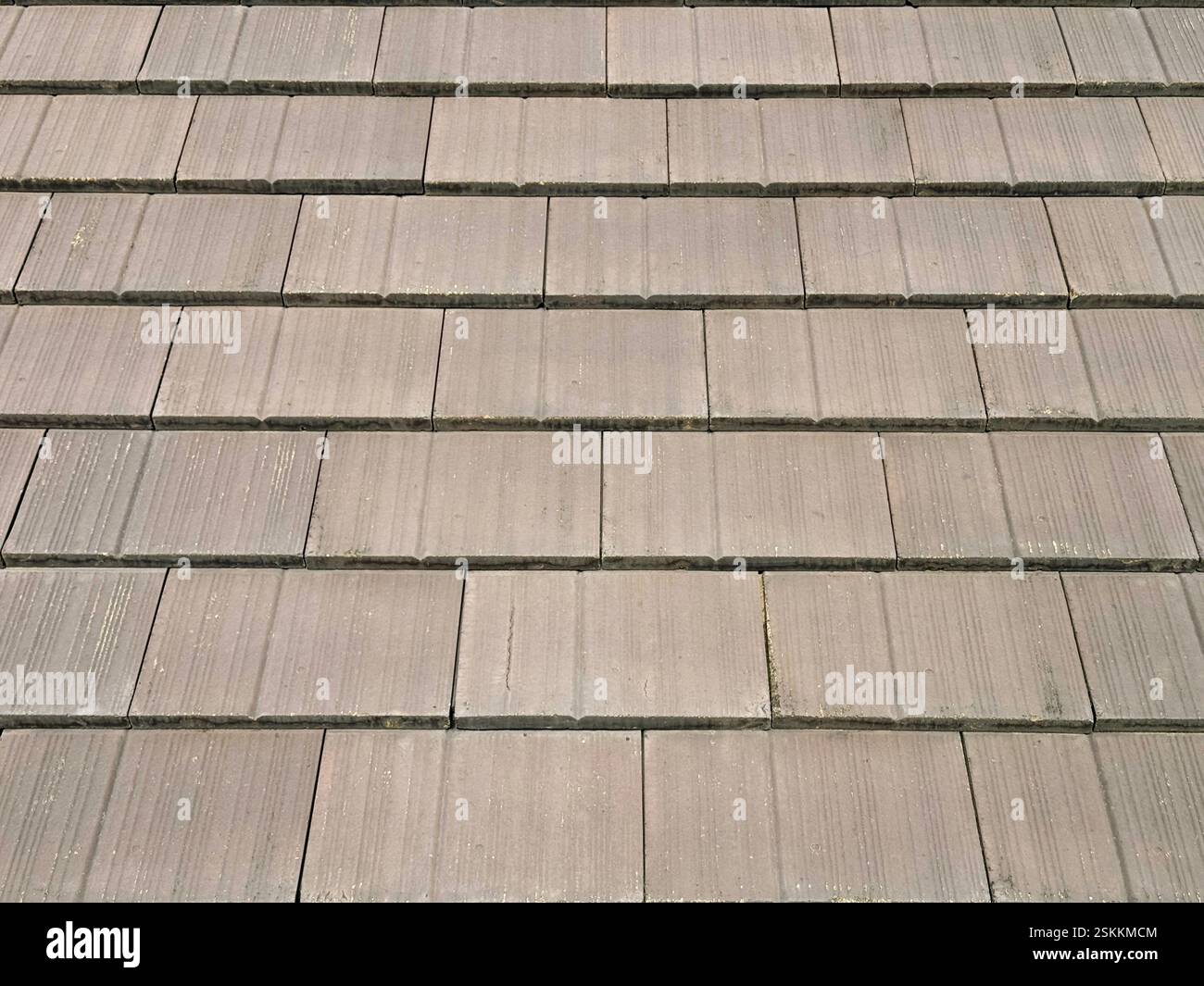 Roof shingles or slate tile material in warm brown color. Clay or slate ...