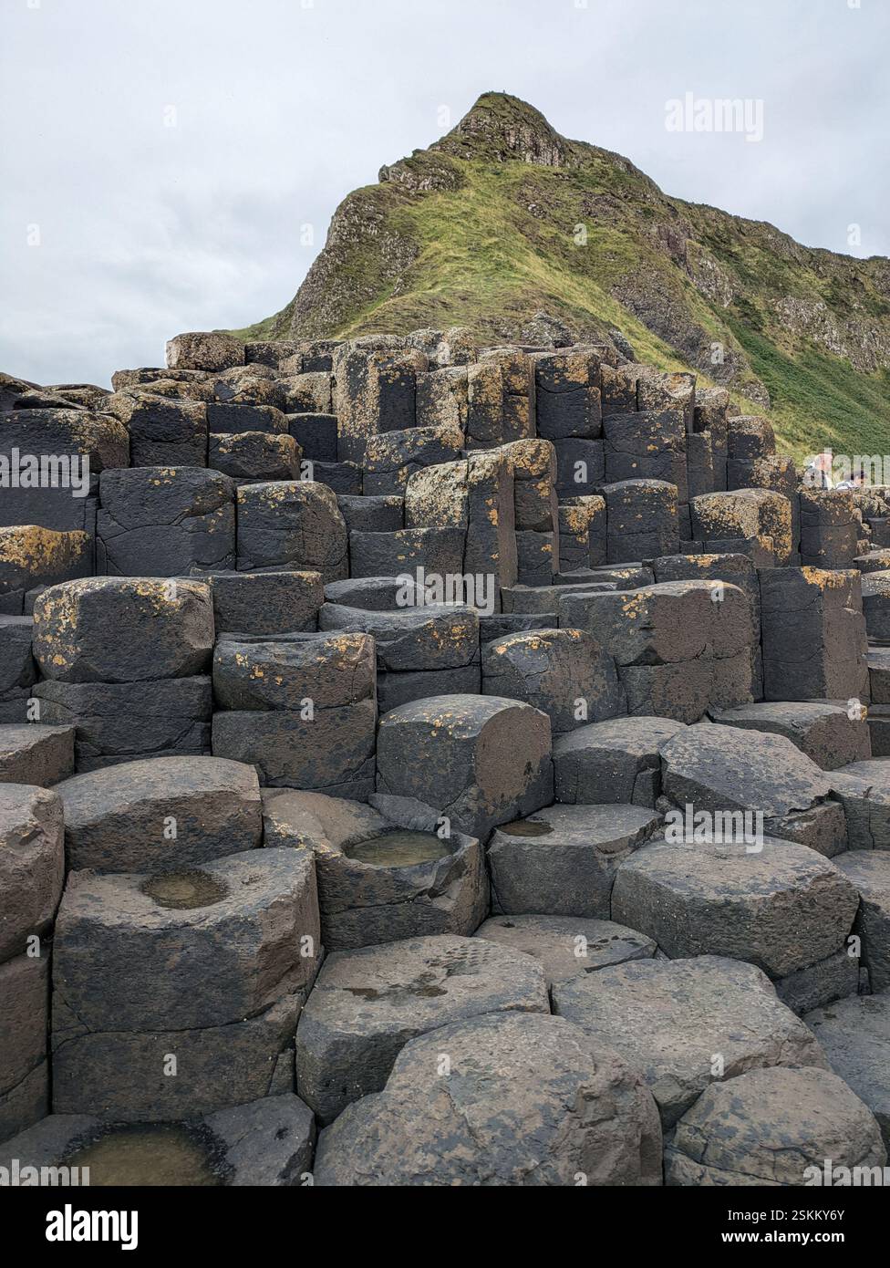 hiking along the Giants Causeway cliffs Stock Photo - Alamy