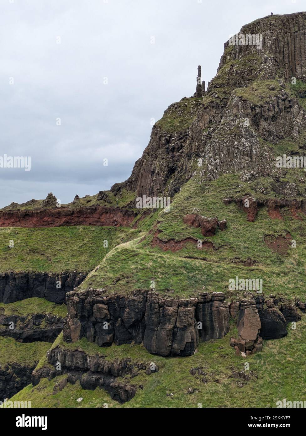 hiking along the Giants Causeway cliffs Stock Photo - Alamy
