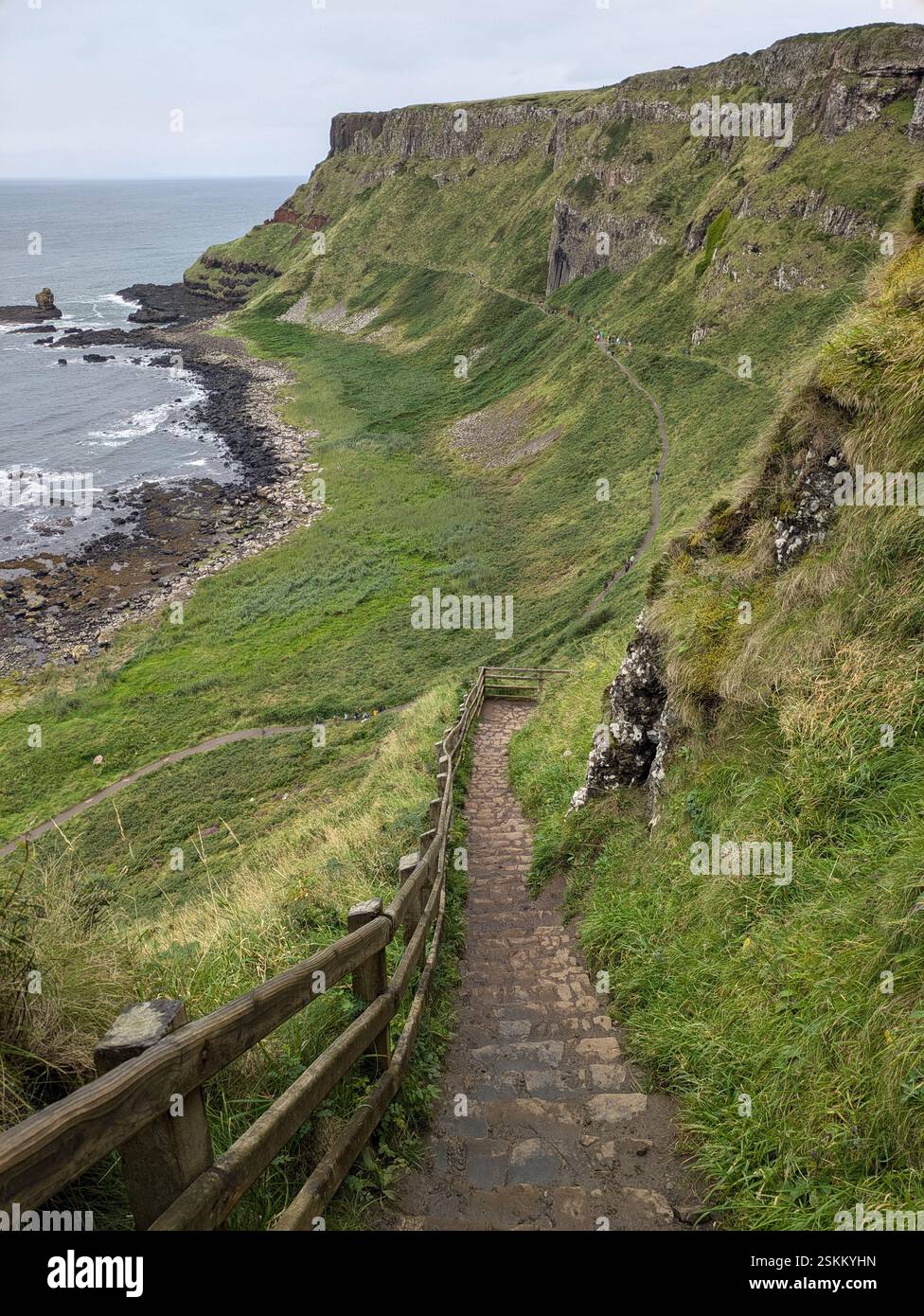 hiking along the Giants Causeway cliffs Stock Photo - Alamy