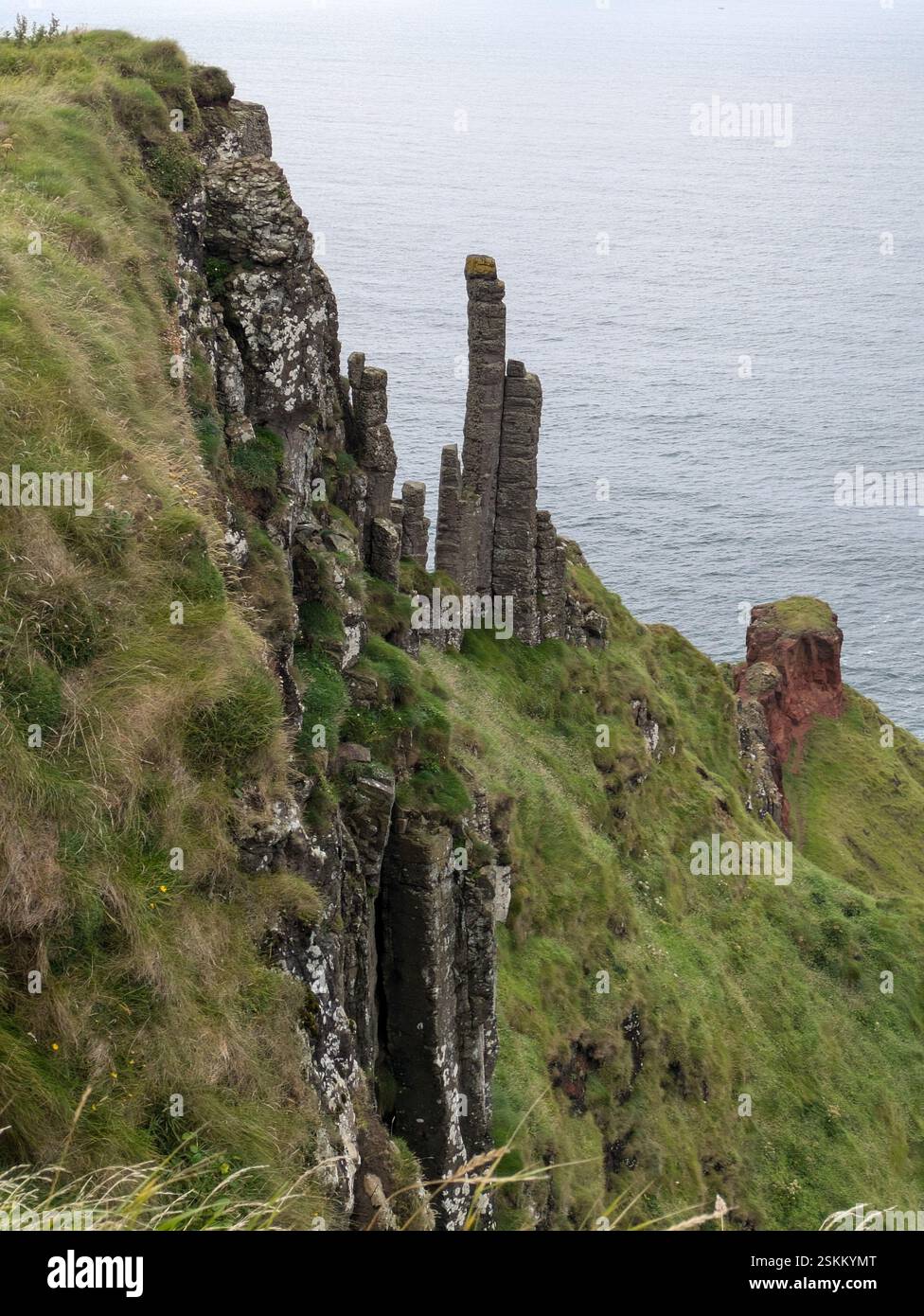 hiking along the Giants Causeway cliffs Stock Photo - Alamy